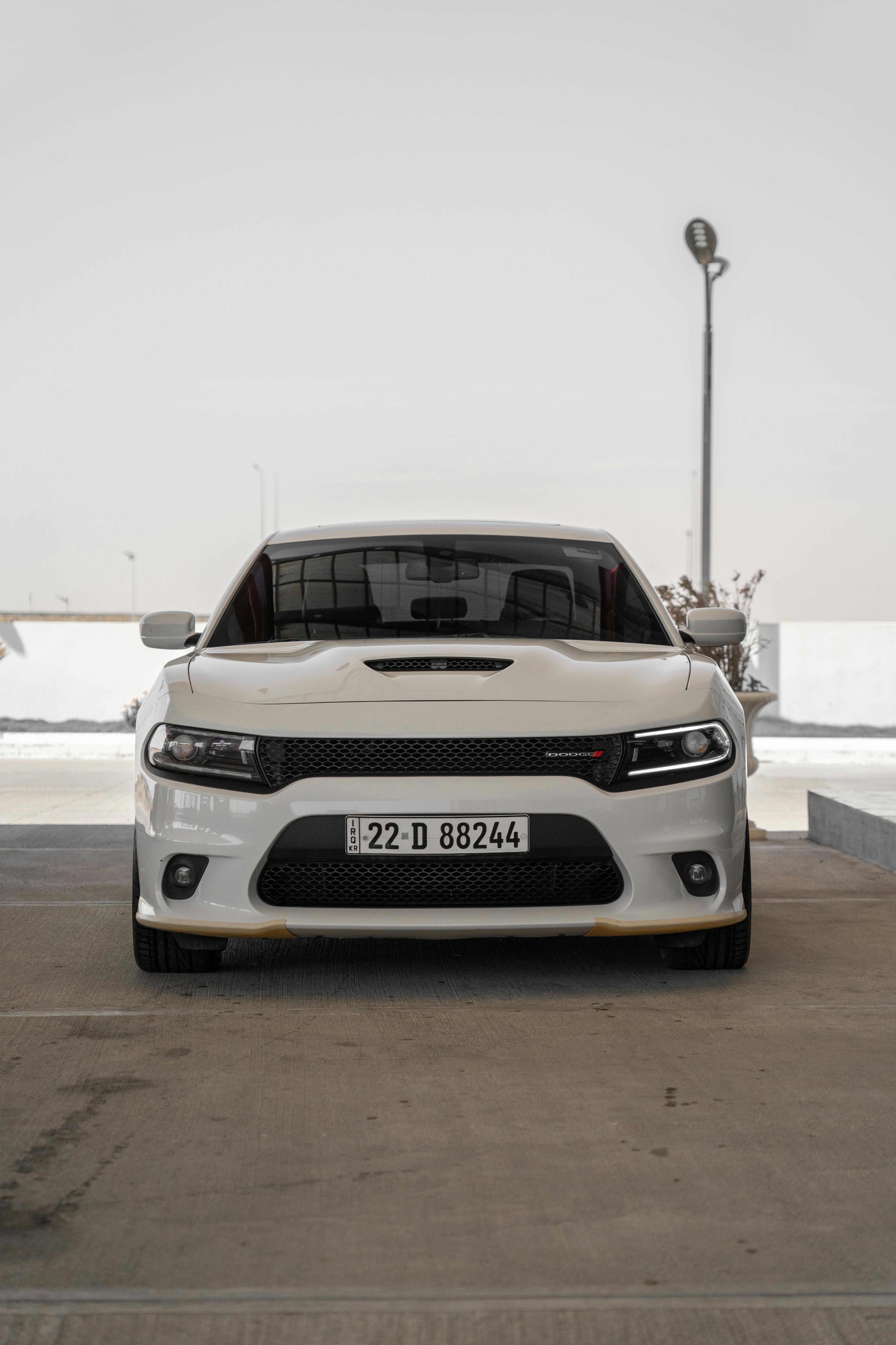 White Dodge Charger SRT Hellcat Widebody on the Top Floor of the ...