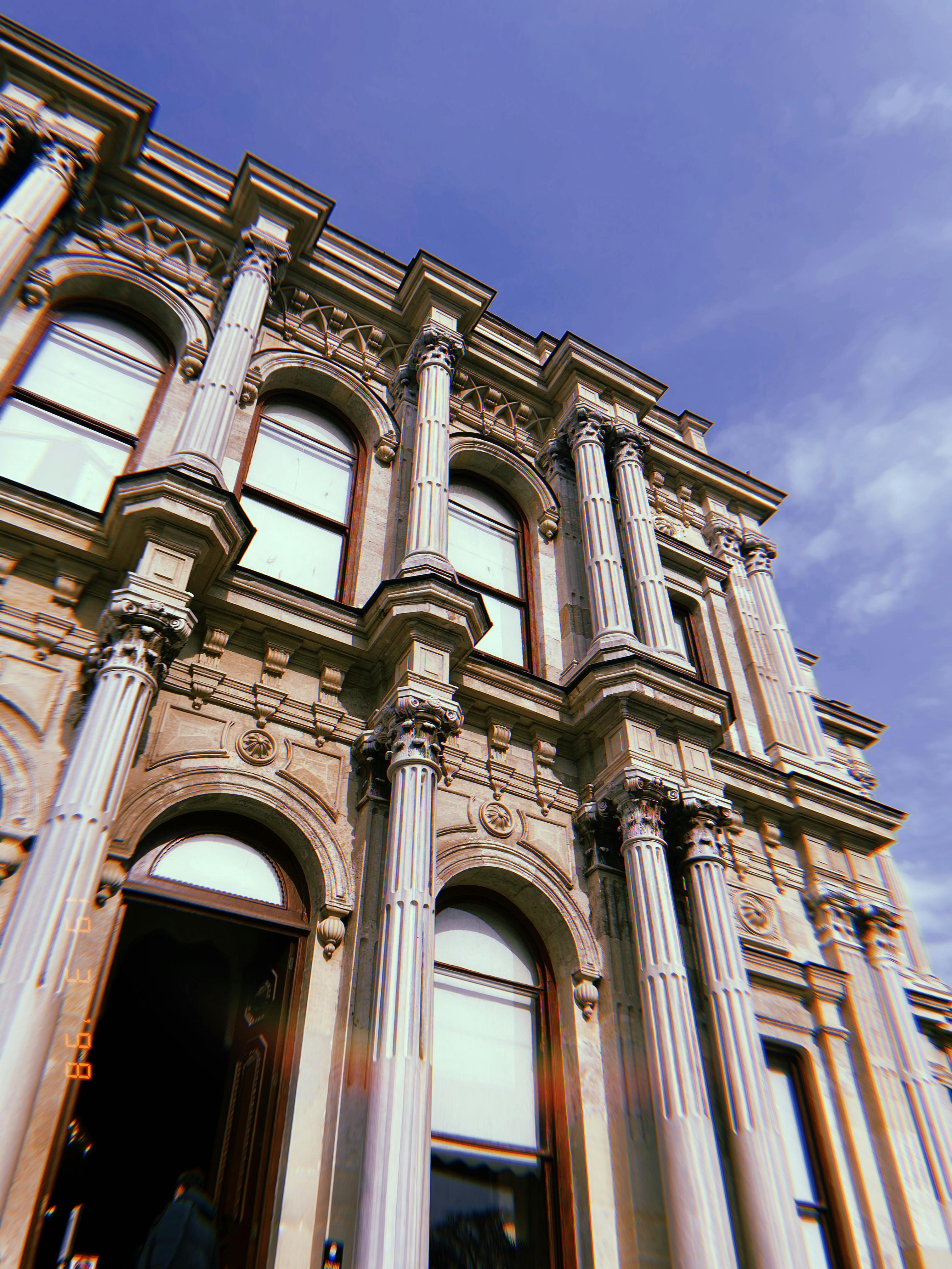 Historic Architectural Facade with Columns · Free Stock Photo