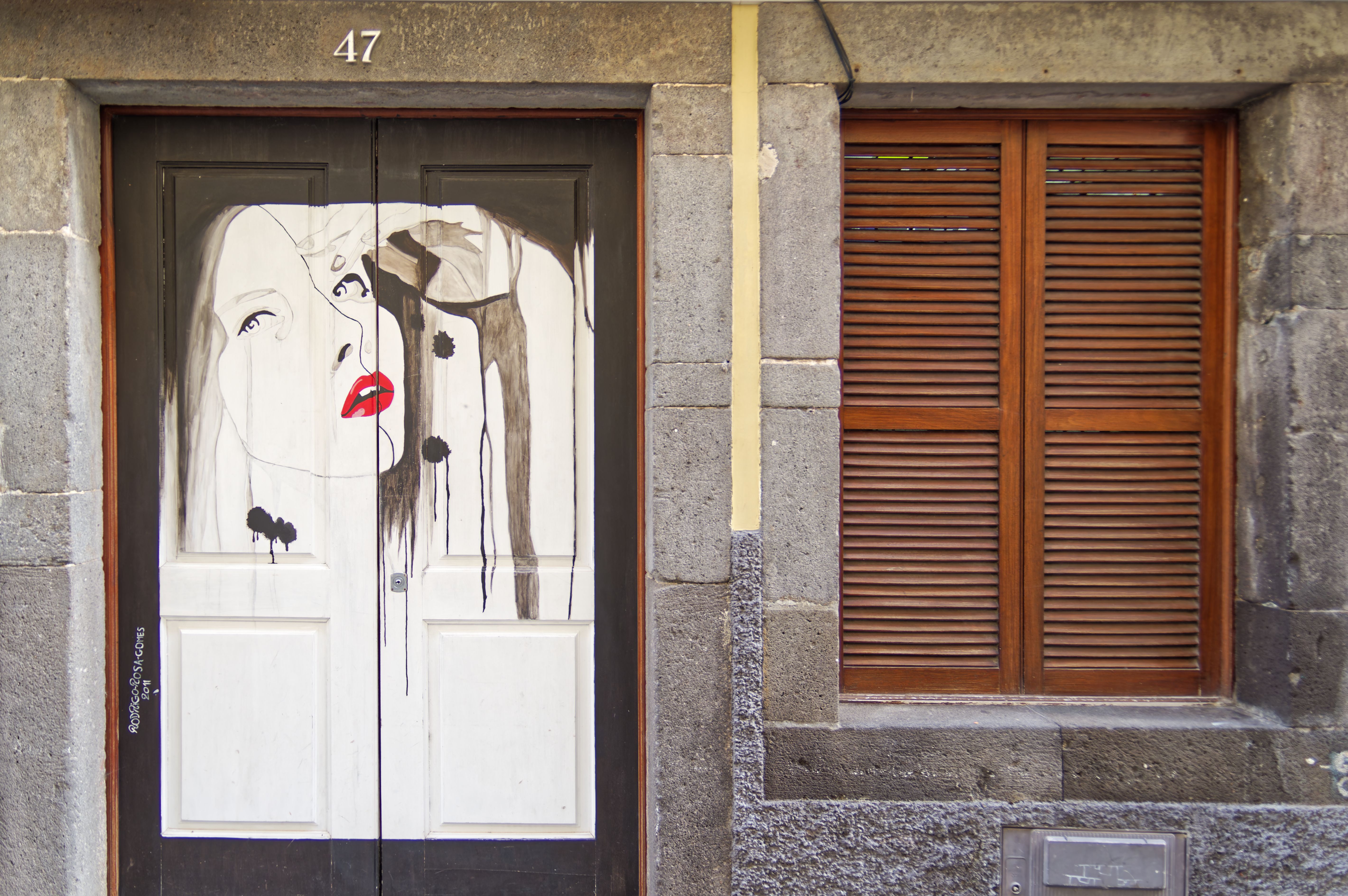 Street Art of Woman's Face on Building · Free Stock Photo