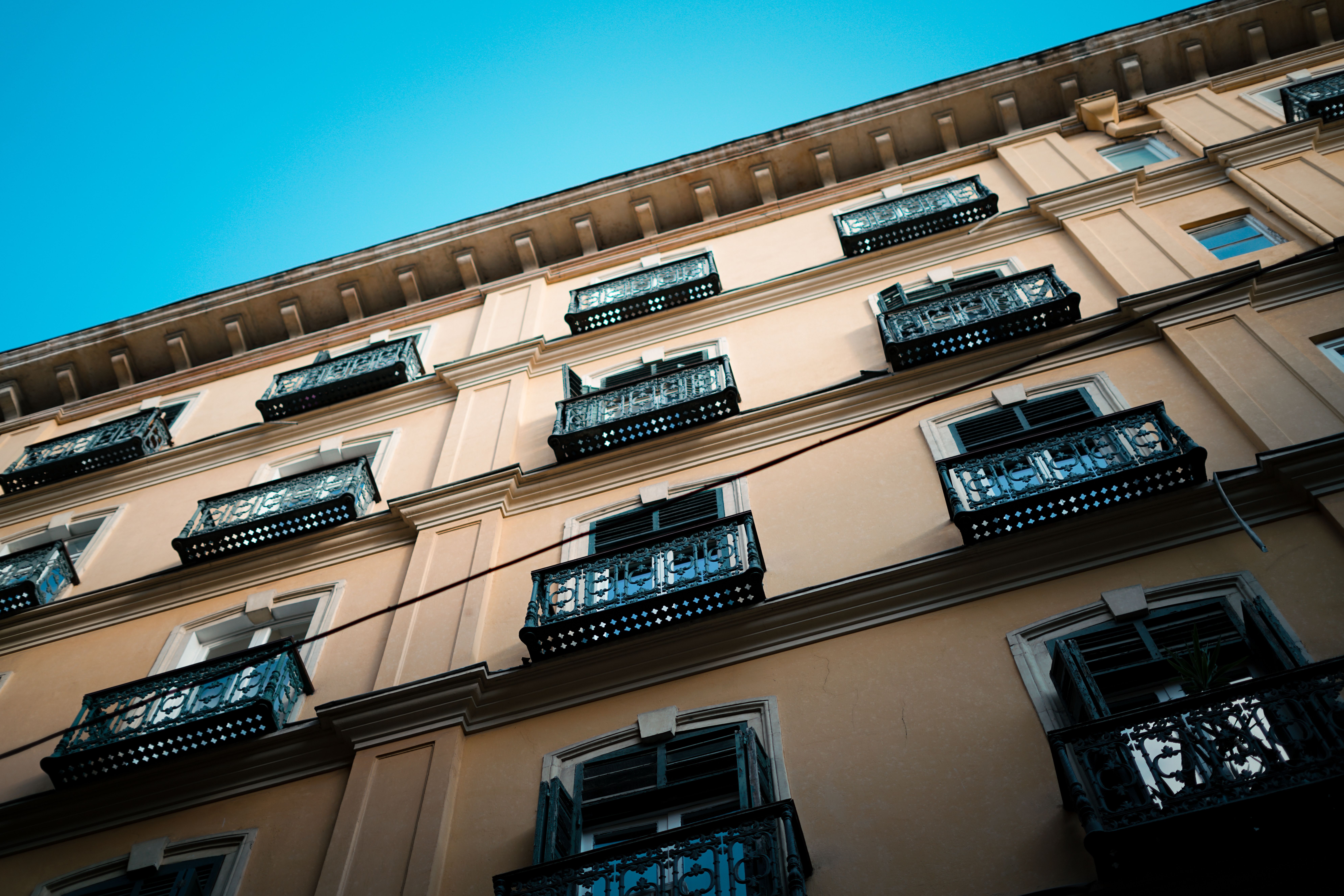 Charming European Building with Iron Balconies · Free Stock Photo