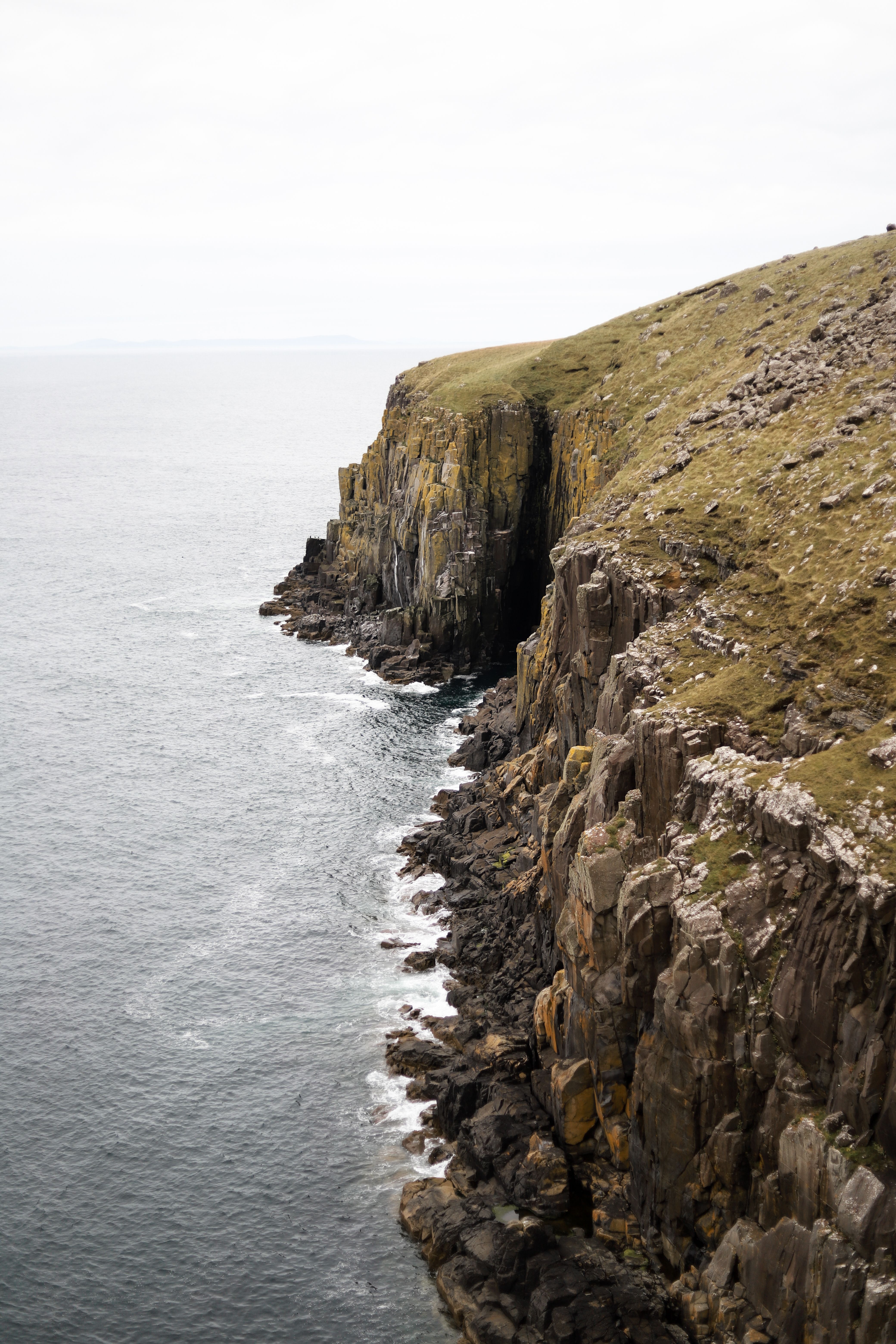 Majestic Coastal Cliff Overlooking Ocean · Free Stock Photo