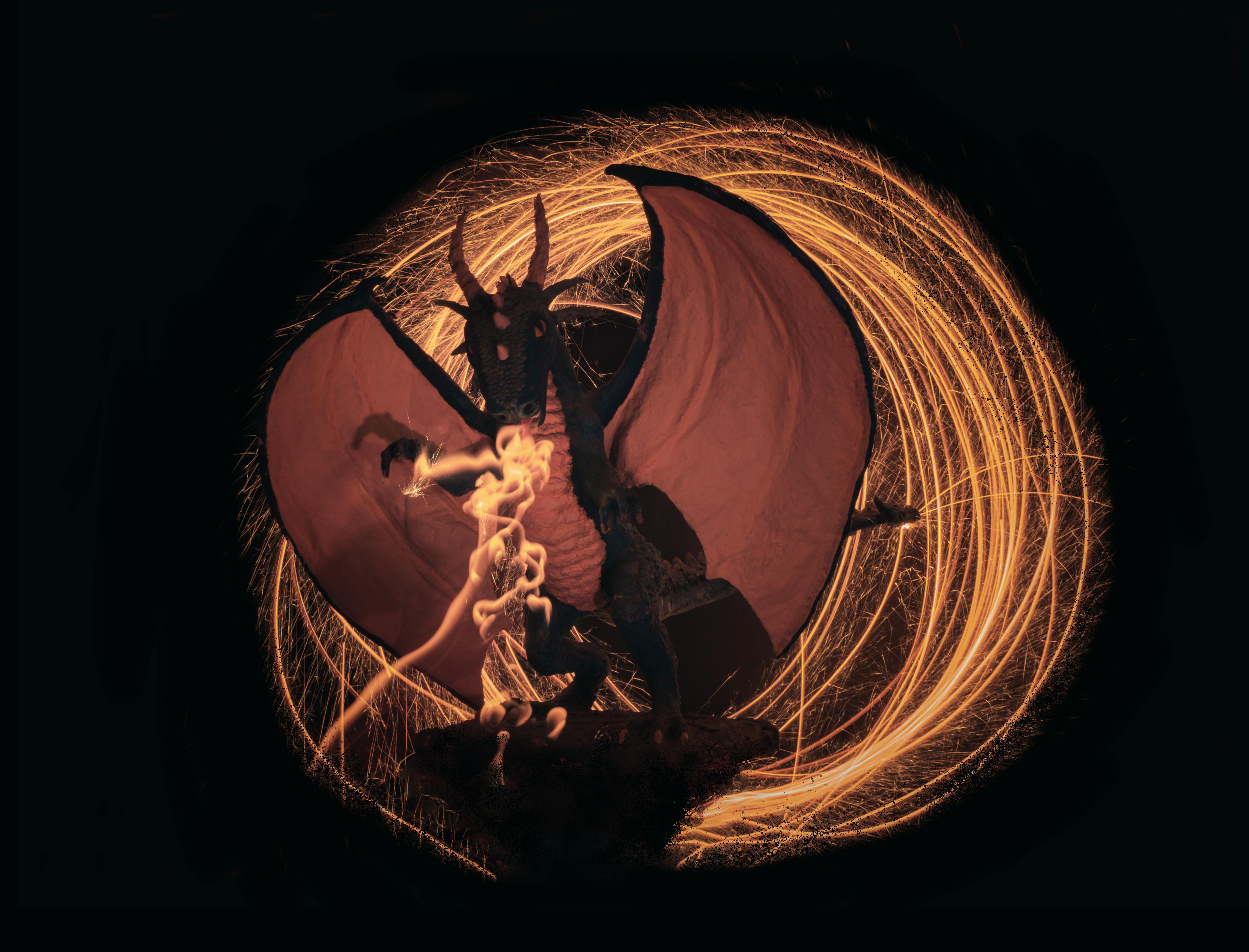 Fiery Dragon with Dynamic Light Trails · Free Stock Photo