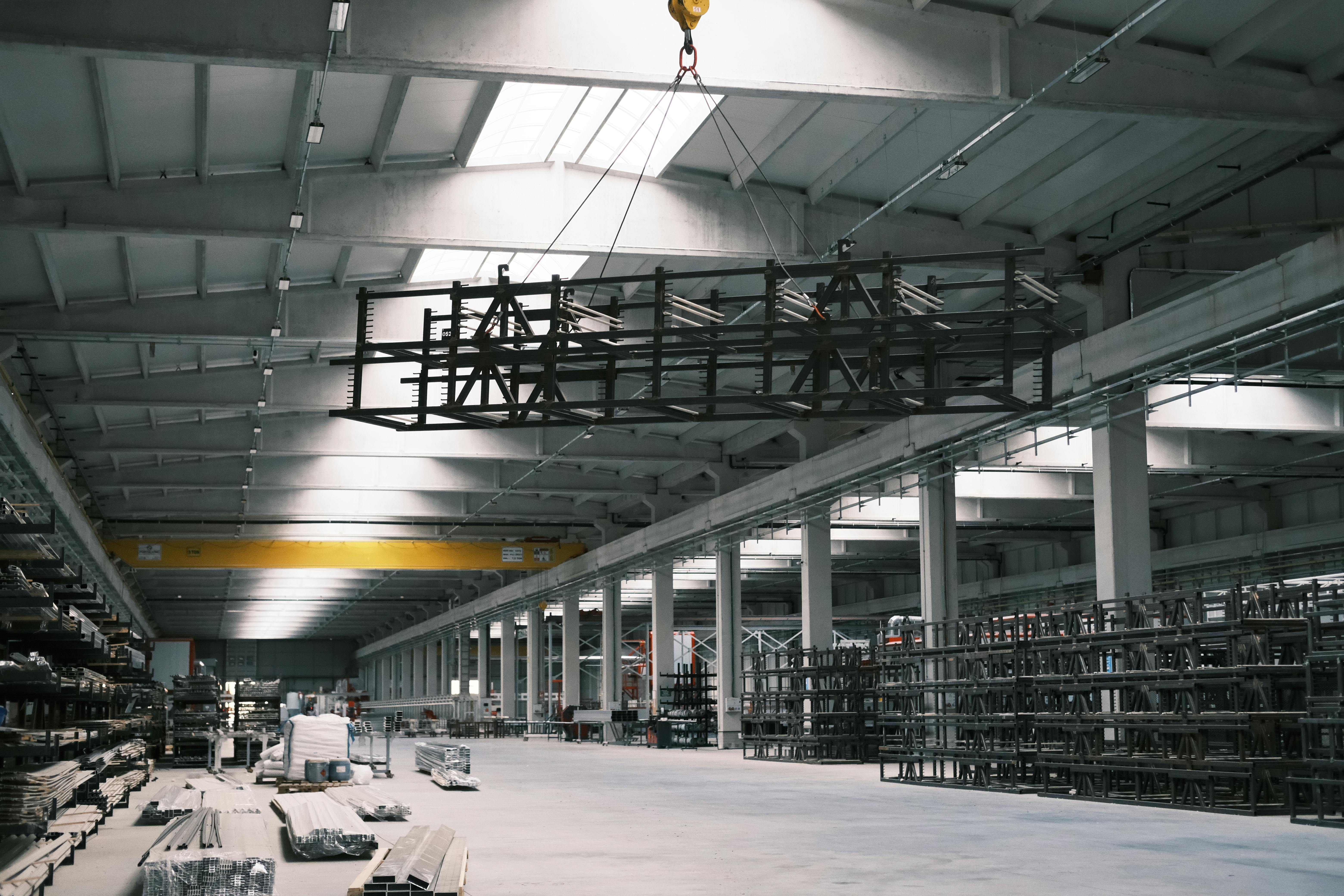 Large Industrial Warehouse with Overhead Crane · Free Stock Photo