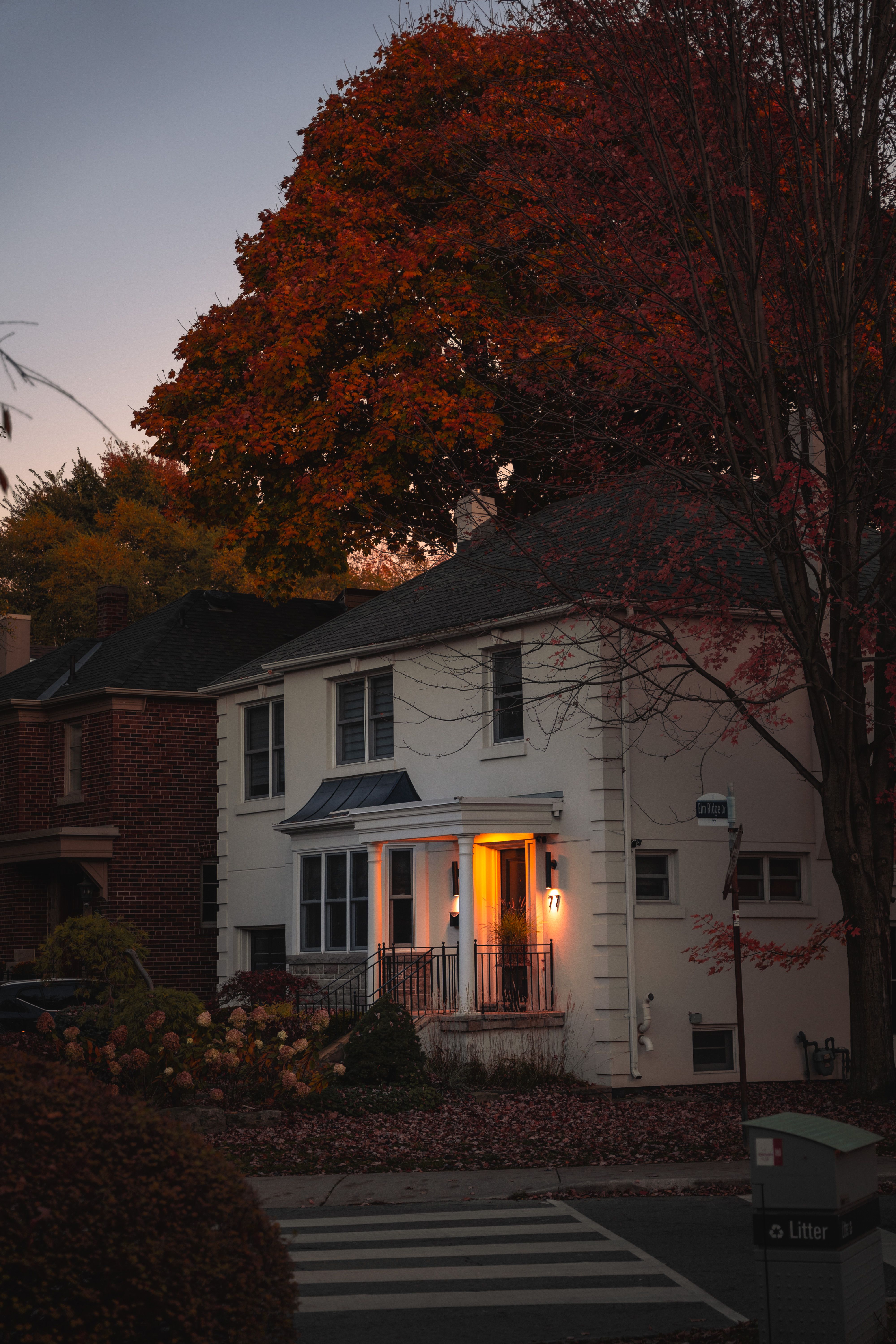 Charming Suburban House in Fall Twilight Setting · Free Stock Photo