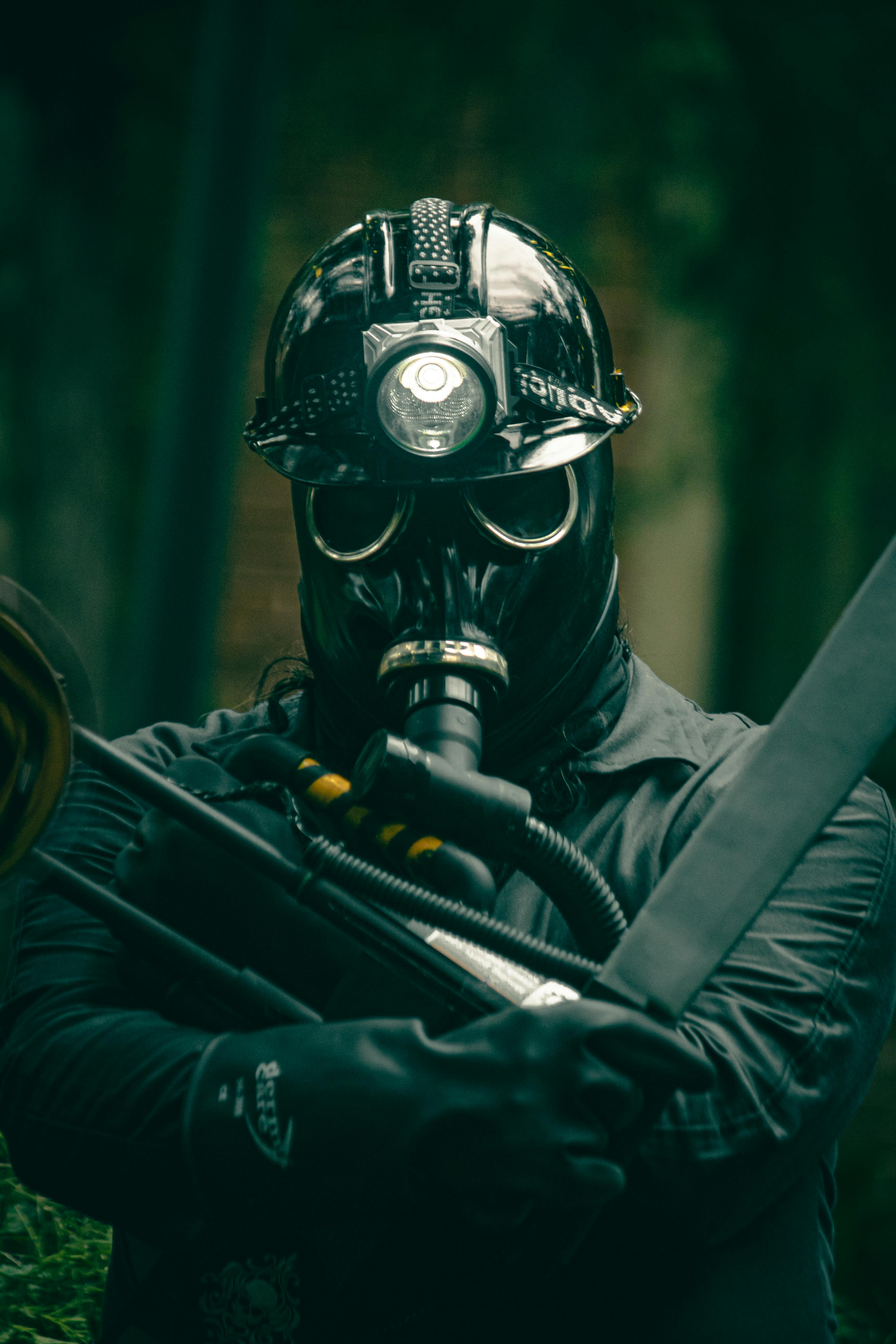 Dark Cosplay Character in Gas Mask Costume · Free Stock Photo