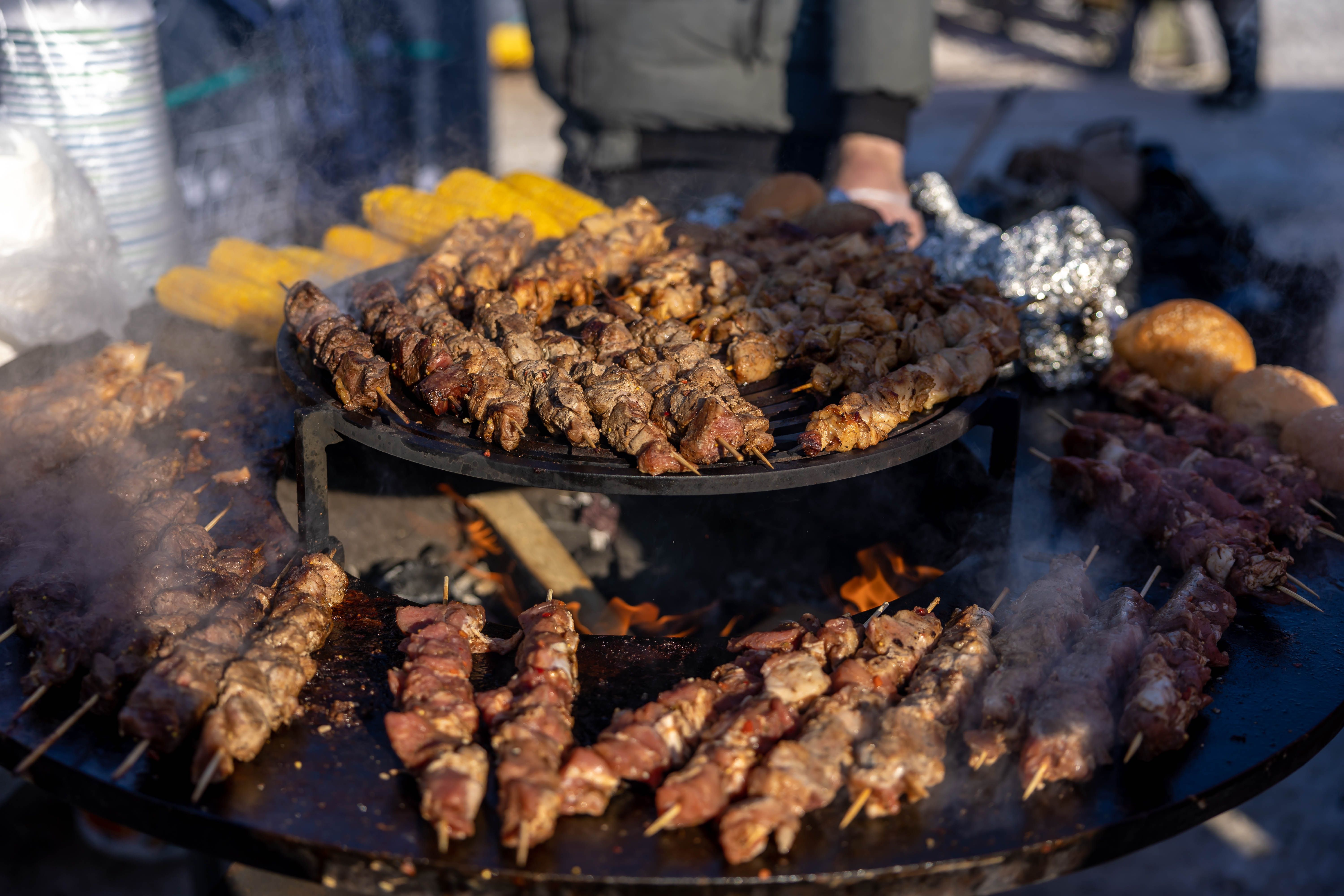Outdoor BBQ with Grilled Meat Skewers · Free Stock Photo