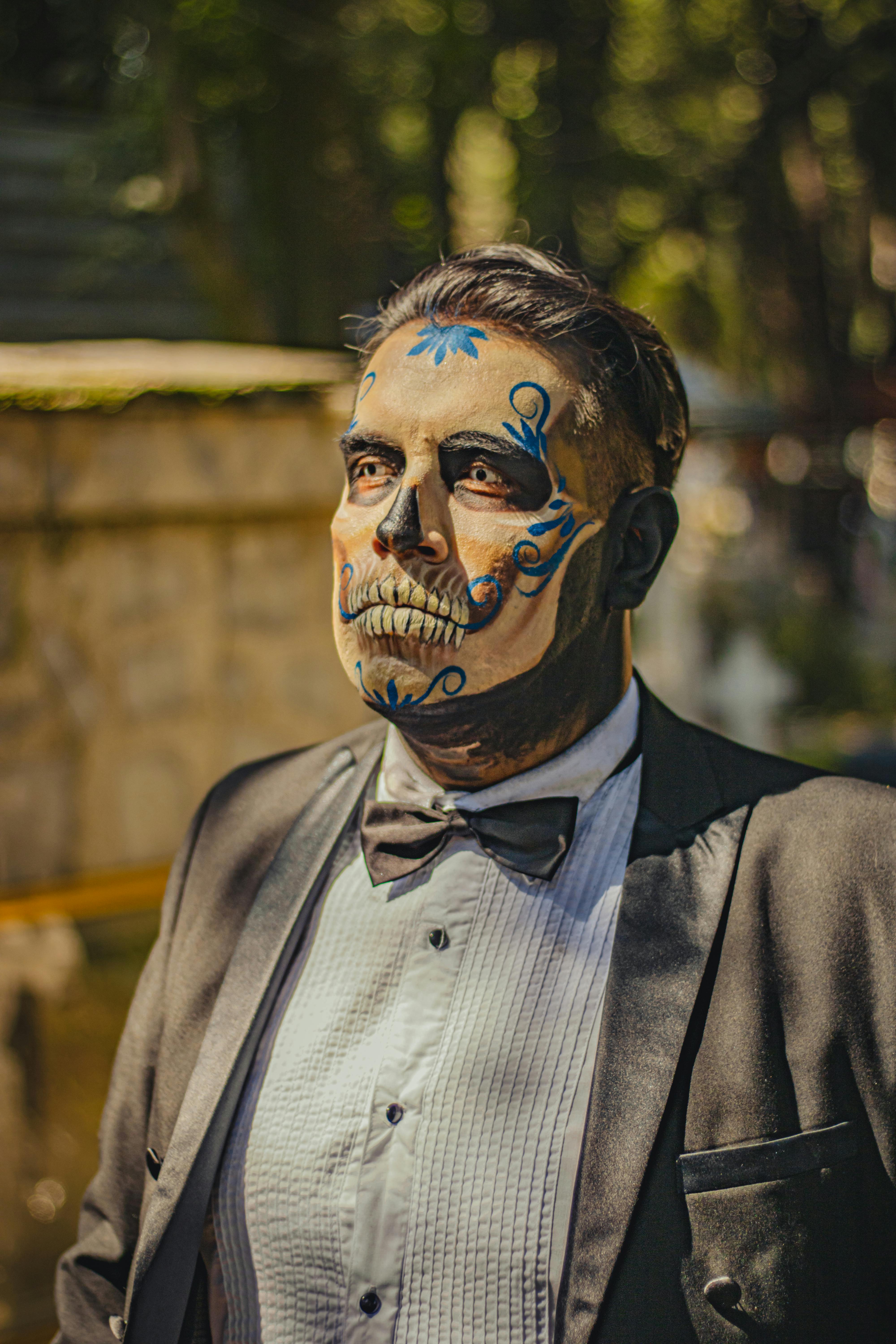 Elegant Catrin with Artistic Day of the Dead Makeup · Free Stock Photo