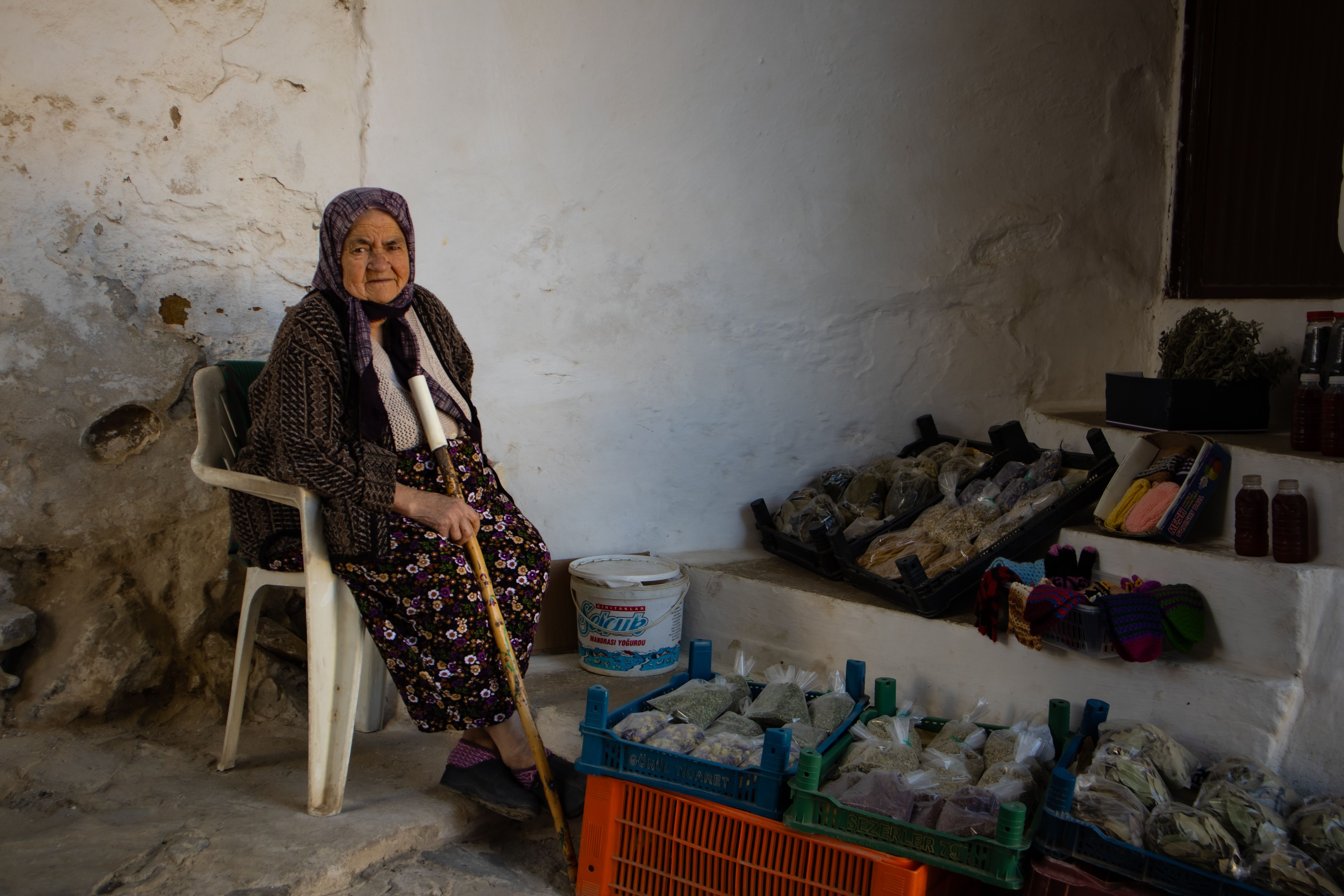 Elderly Woman Selling Goods in Şirince Market · Free Stock Photo