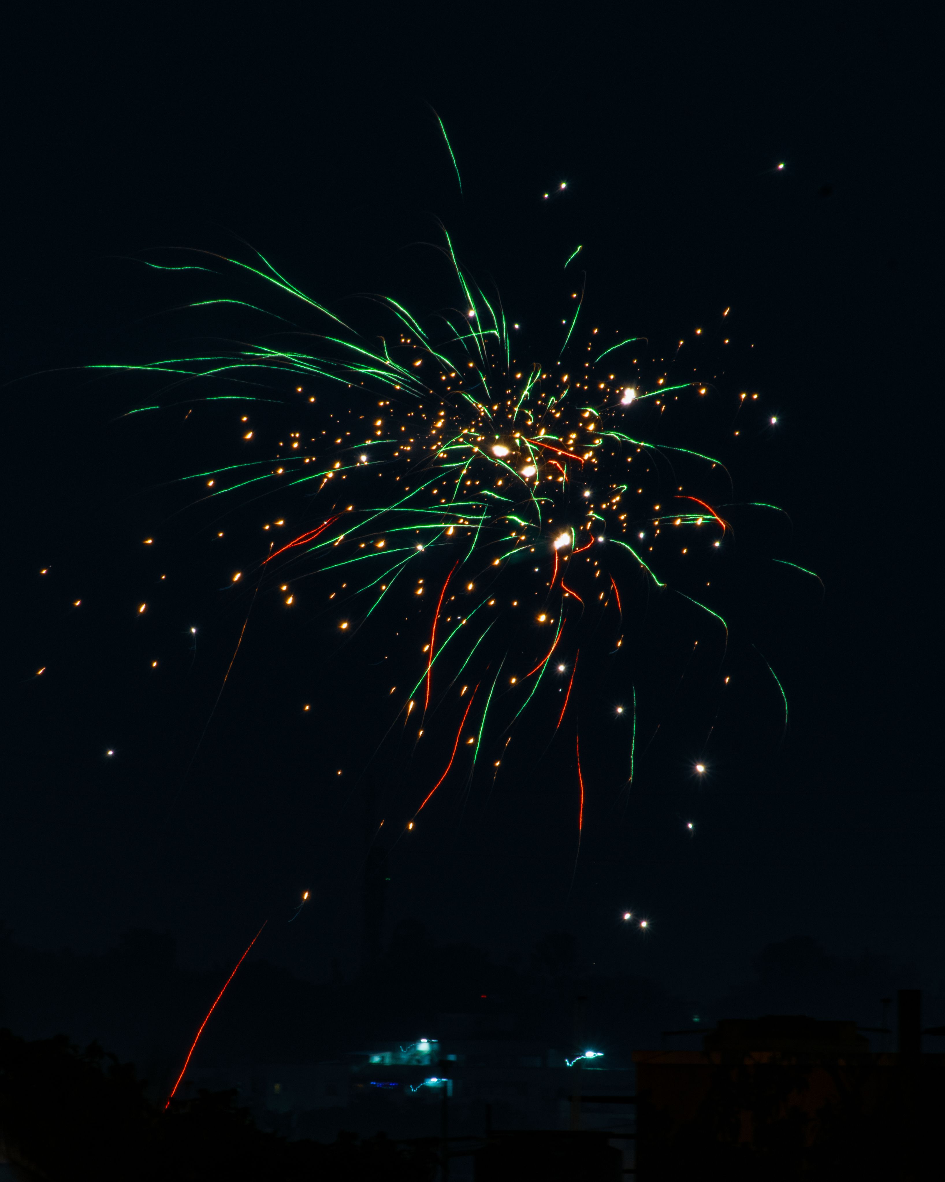 A White Fireworks Display on a Dark Night Sky · Free Stock Photo