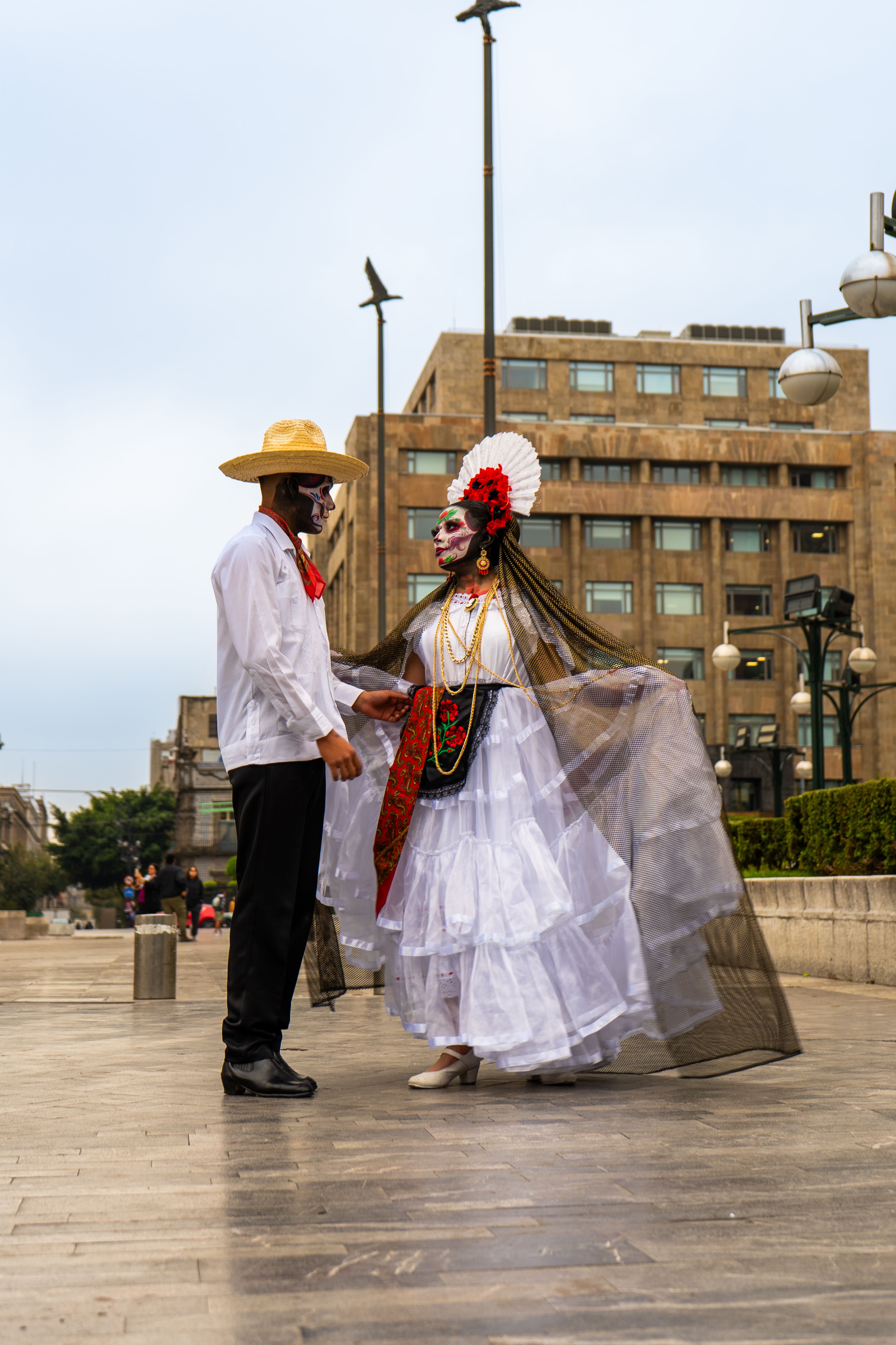 Mexican Couple in Traditional Catrina Attire · Free Stock Photo