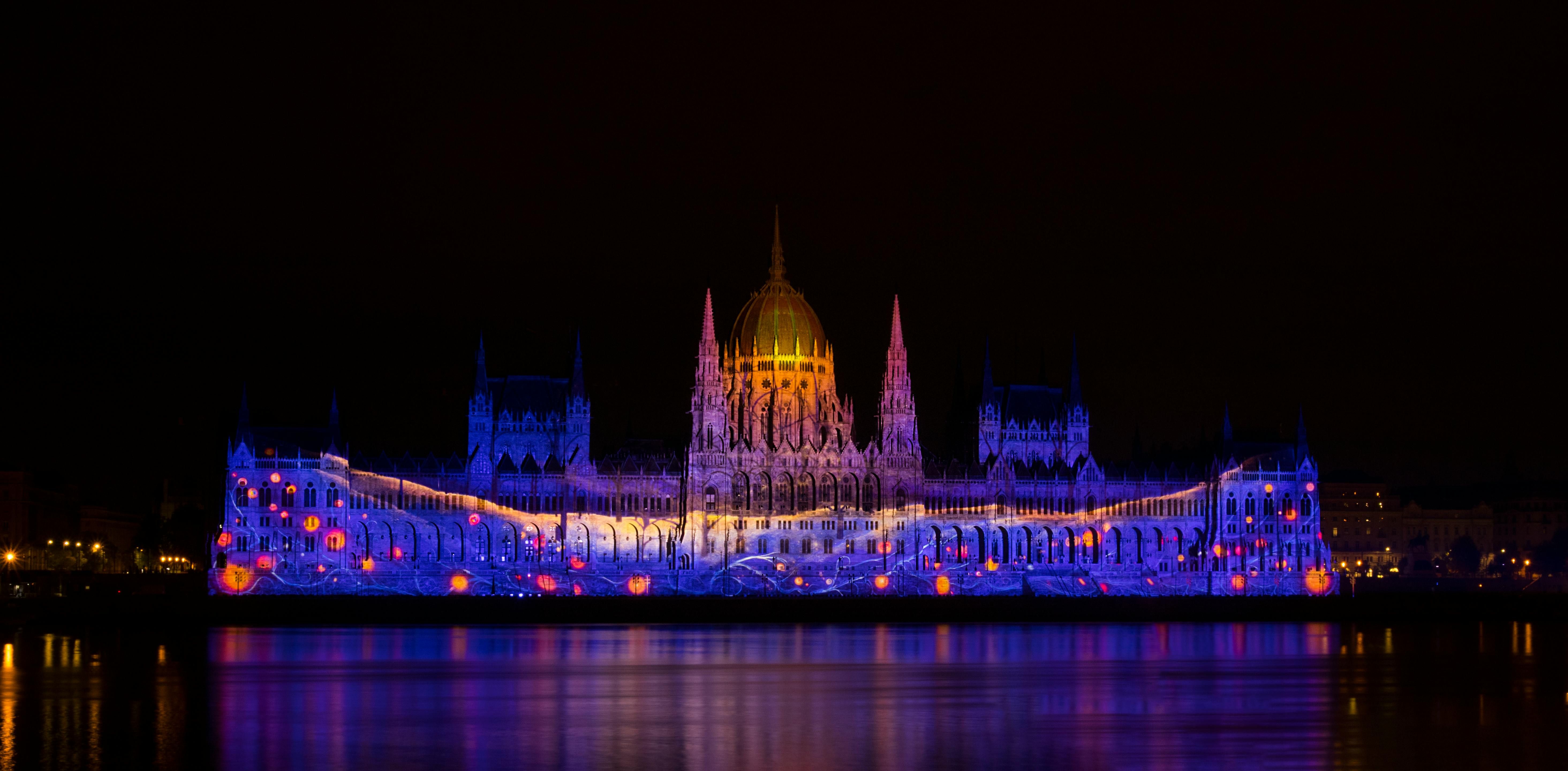 Illuminated Parliament Building at Night in Budapest · Free Stock Photo
