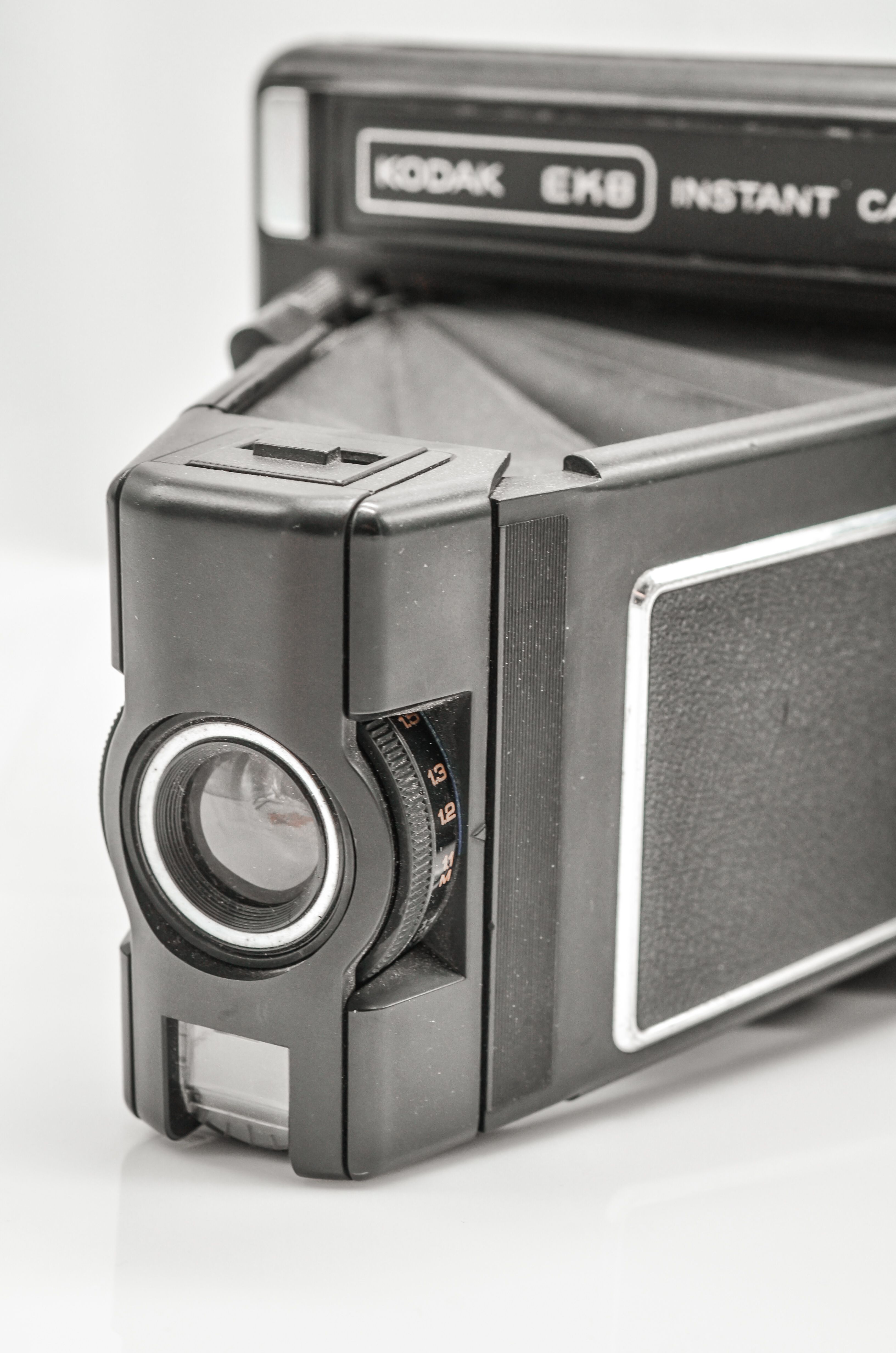 Vintage Kodak Instant Camera on White Background · Free Stock Photo