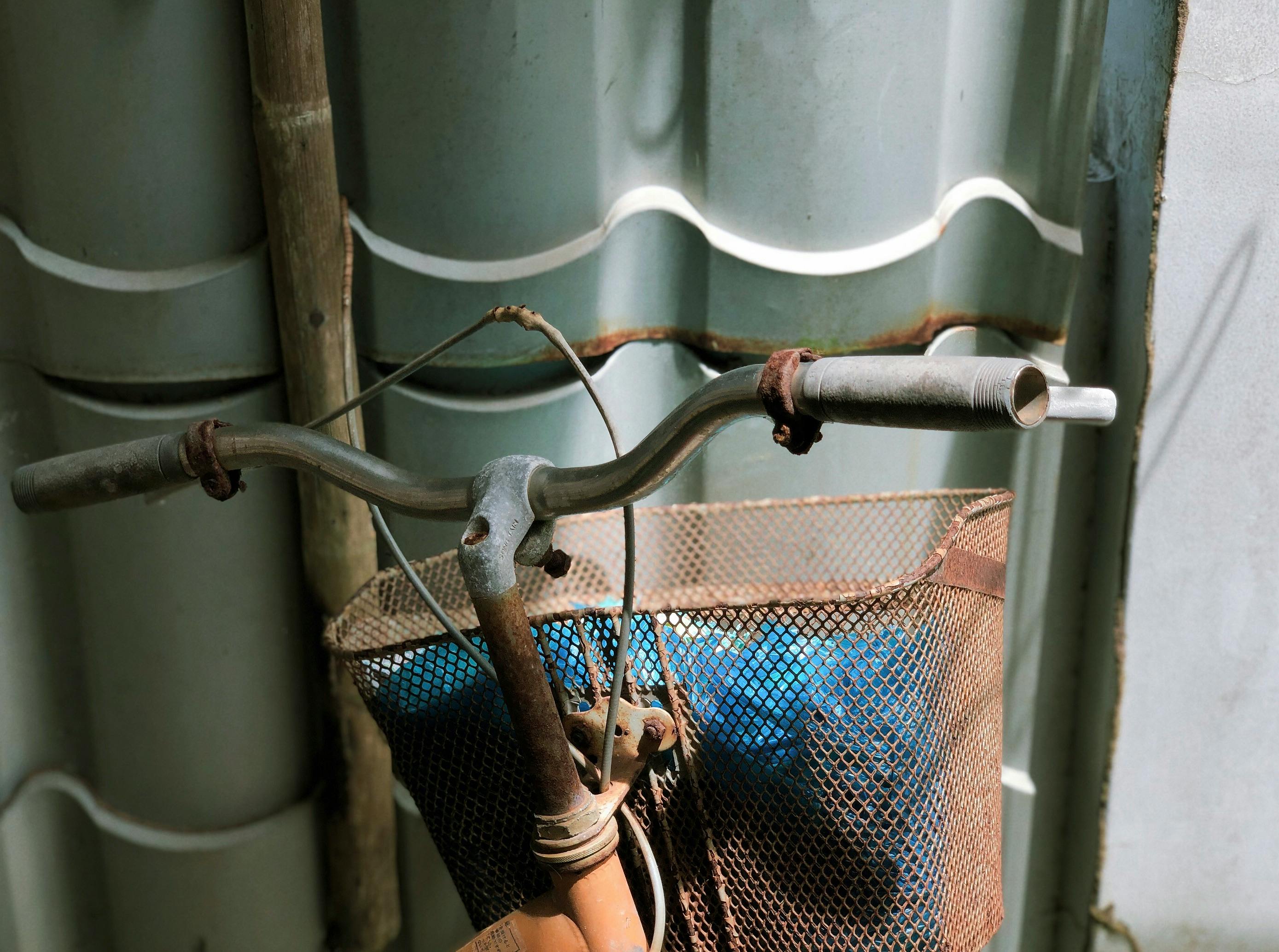 Rustic Bicycle Handle and Basket Close-Up · Free Stock Photo