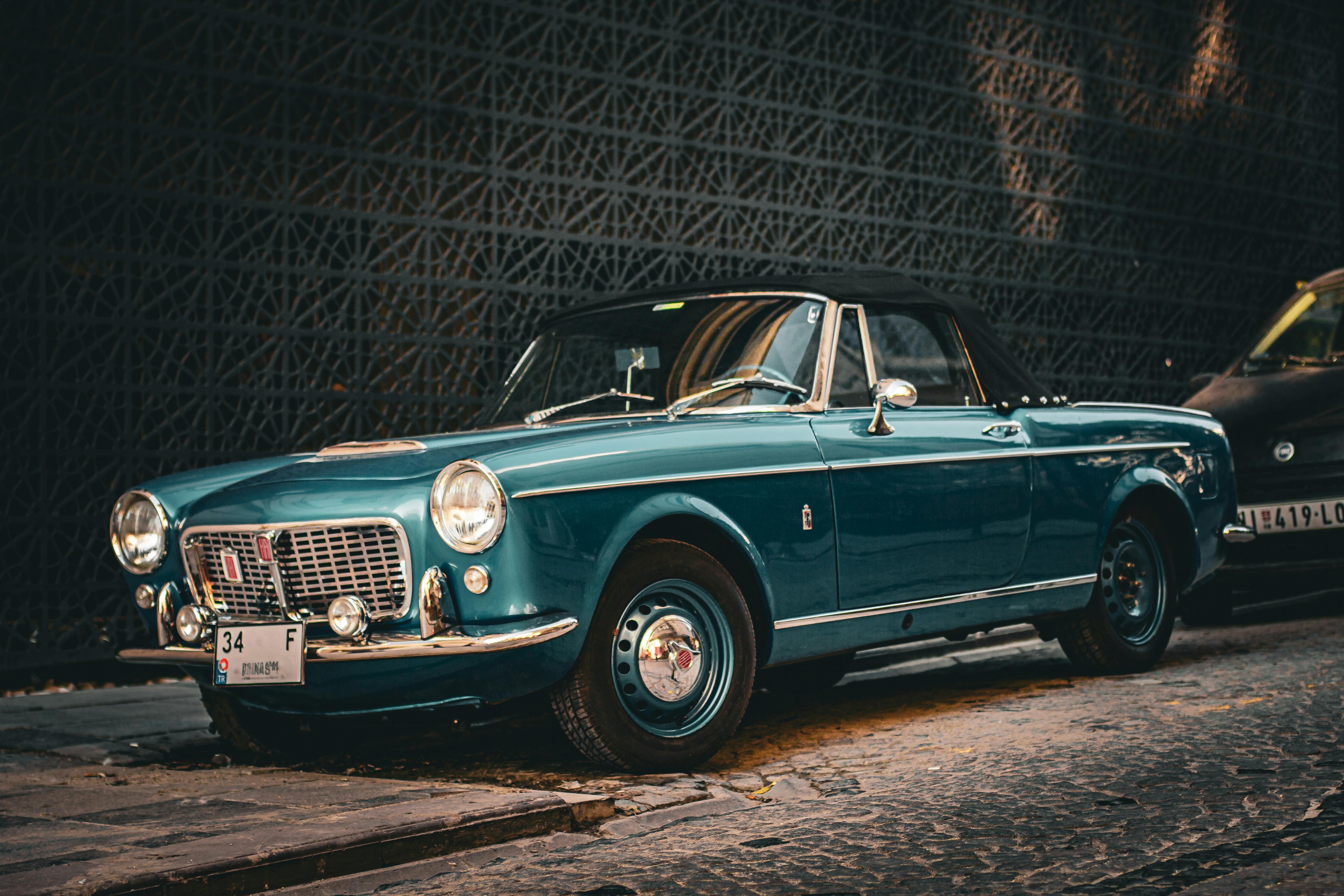 Classic Blue Convertible Car on Urban Street · Free Stock Photo