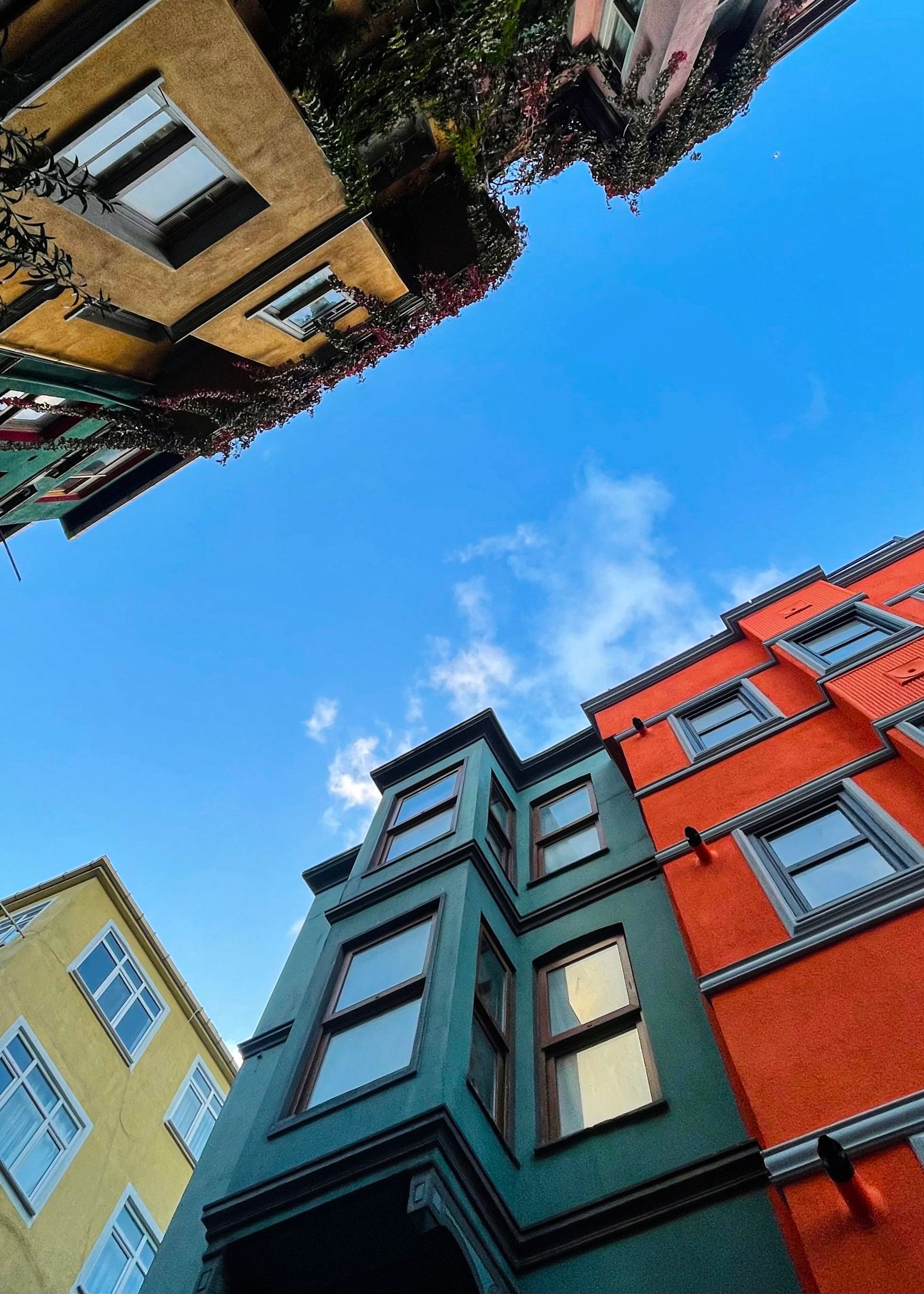 Vibrant Colorful Buildings against Blue Sky · Free Stock Photo