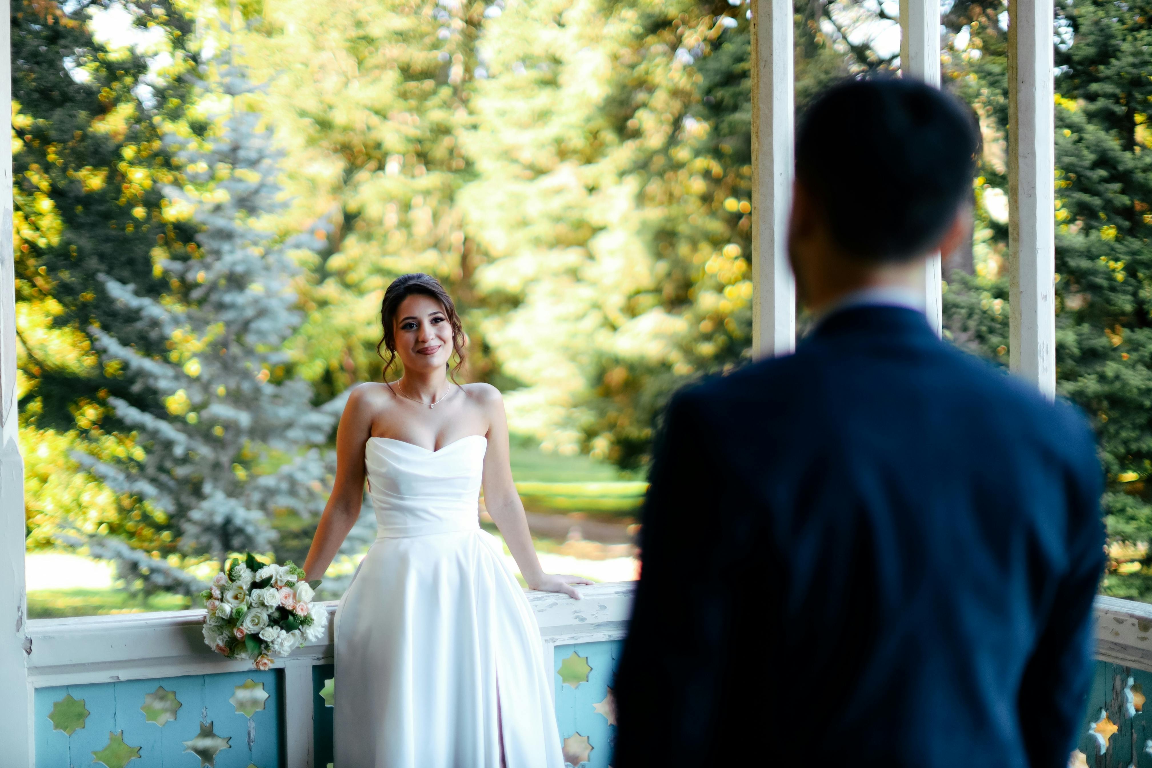 Charming Bride on Scenic Wedding Day Veranda · Free Stock Photo