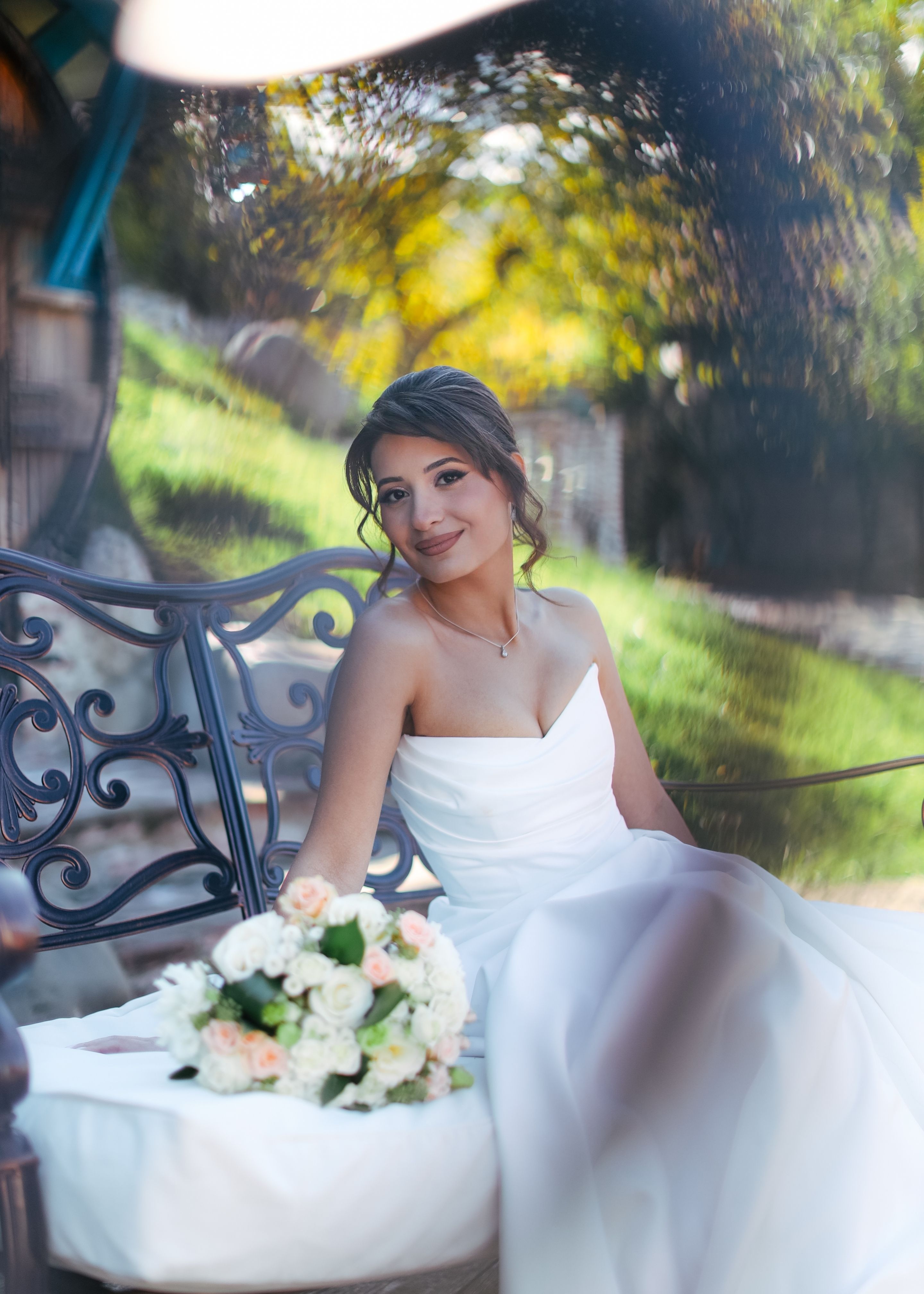 Elegant Outdoor Bride Holding Bouquets · Free Stock Photo