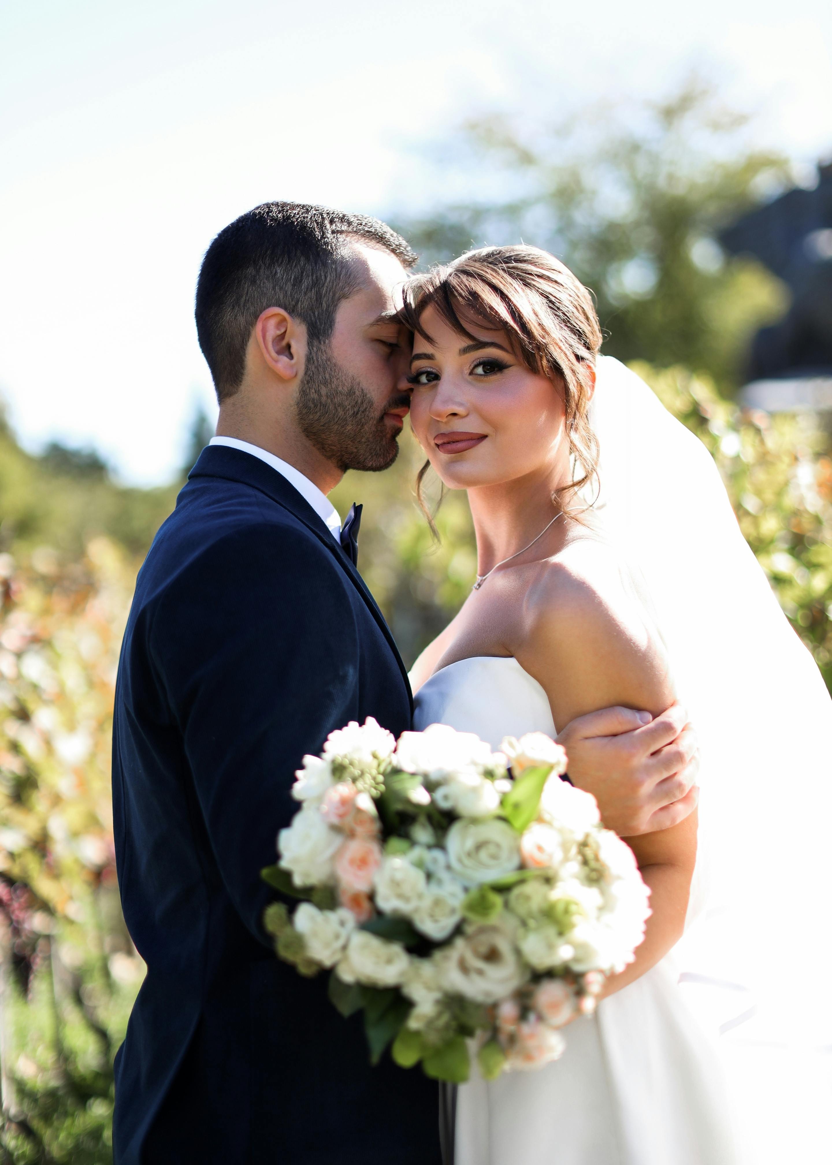 Romantic Outdoor Wedding Portrait of a Couple · Free Stock Photo