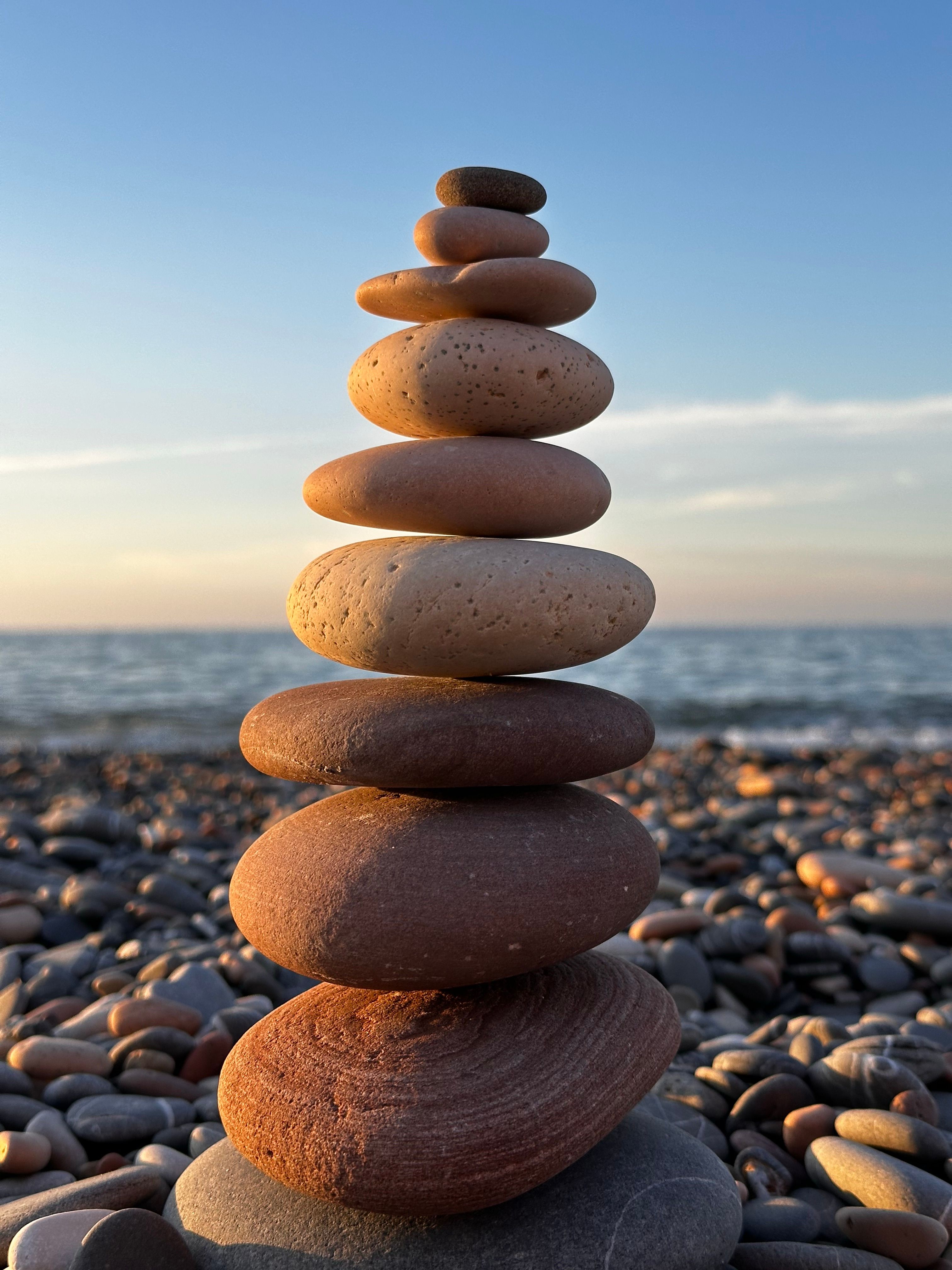 Zen Stone Stack by the Seaside at Sunset · Free Stock Photo
