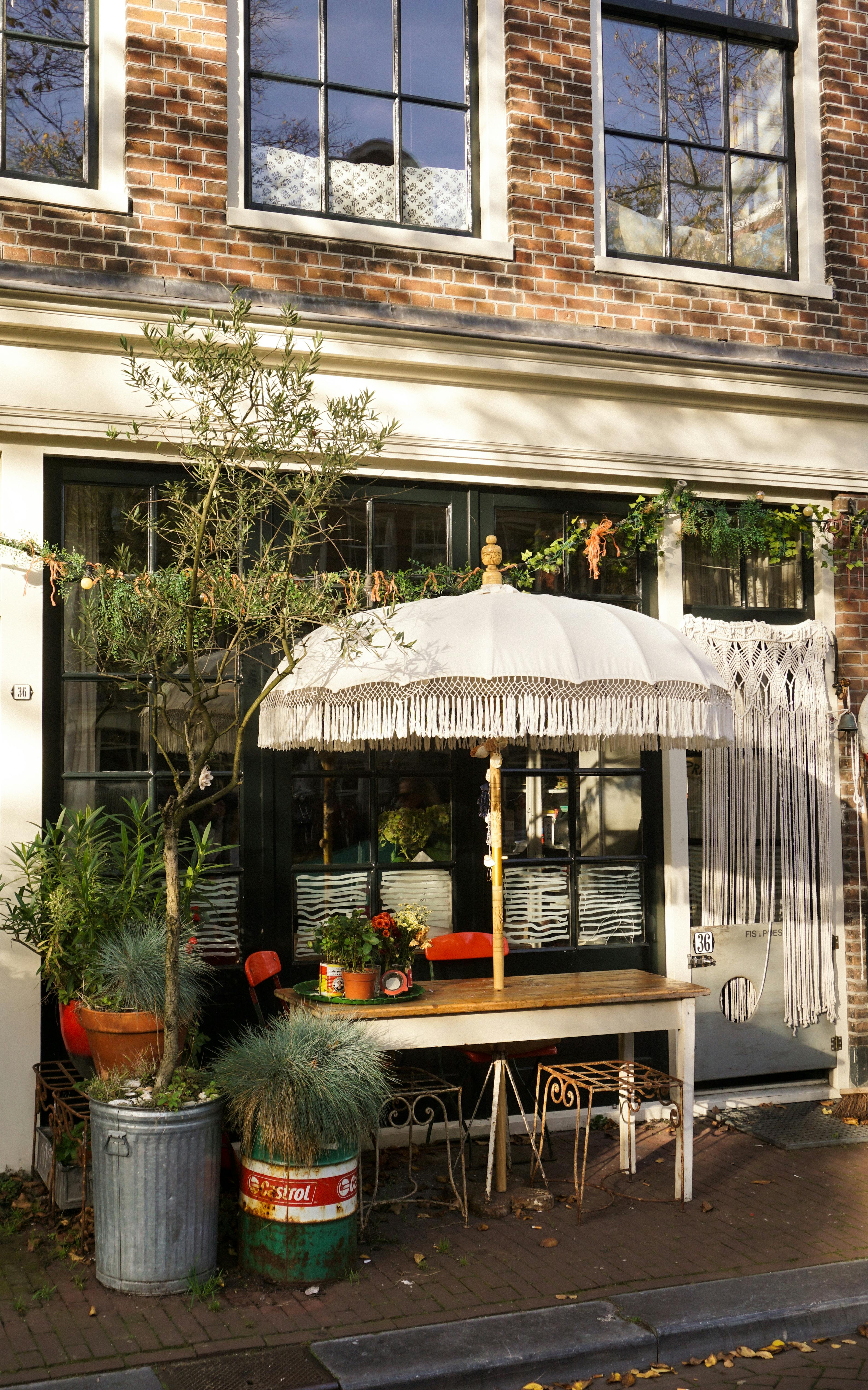 Charming Outdoor Cafe Setting in Amsterdam · Free Stock Photo