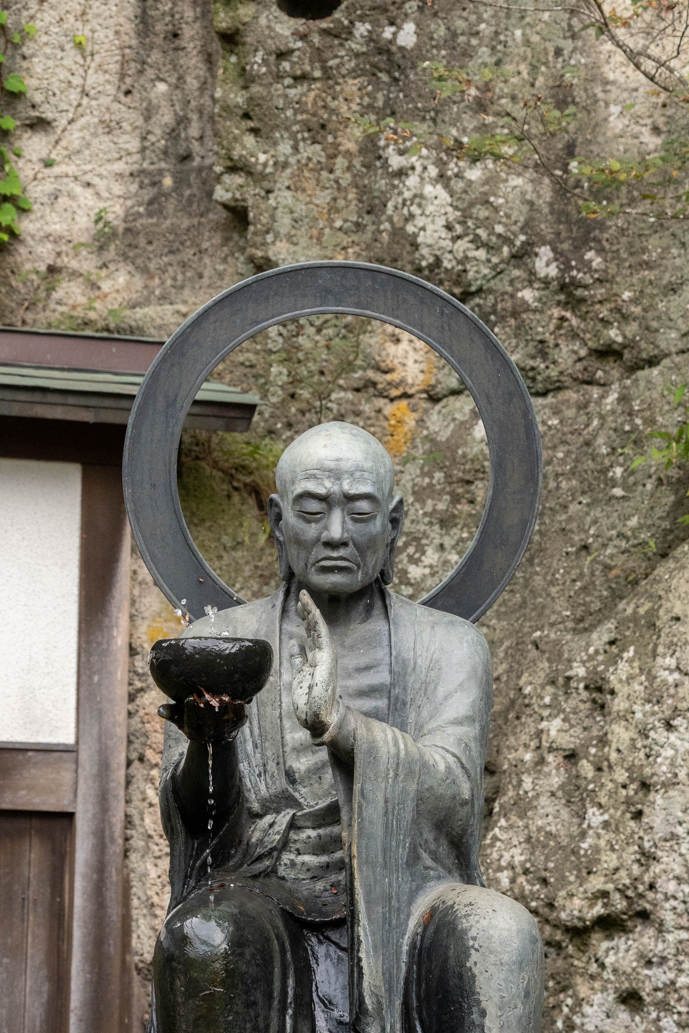 Zen Monk Statue in Stone Garden Setting · Free Stock Photo