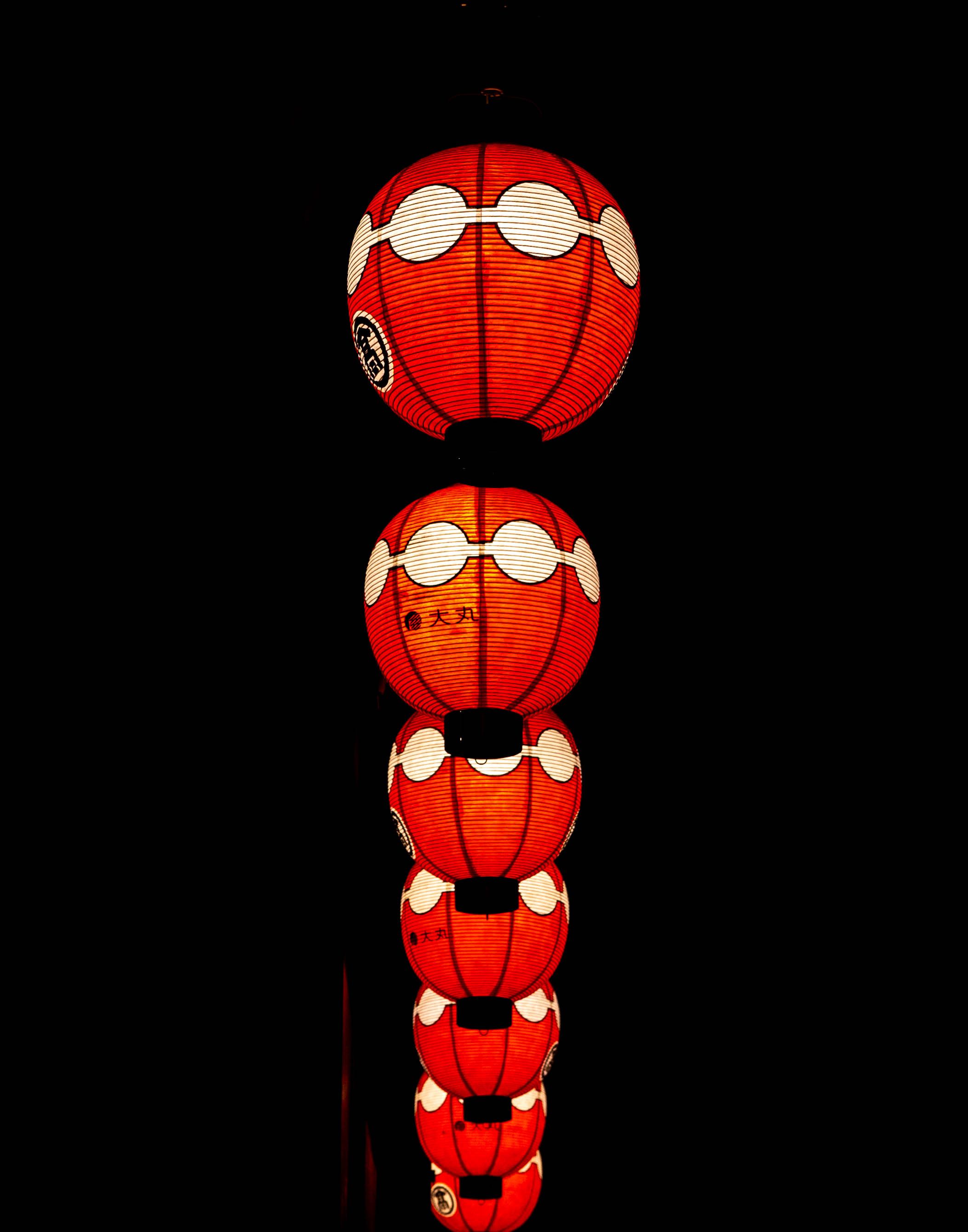 Vertical String of Red Japanese Lanterns at Night · Free Stock Photo