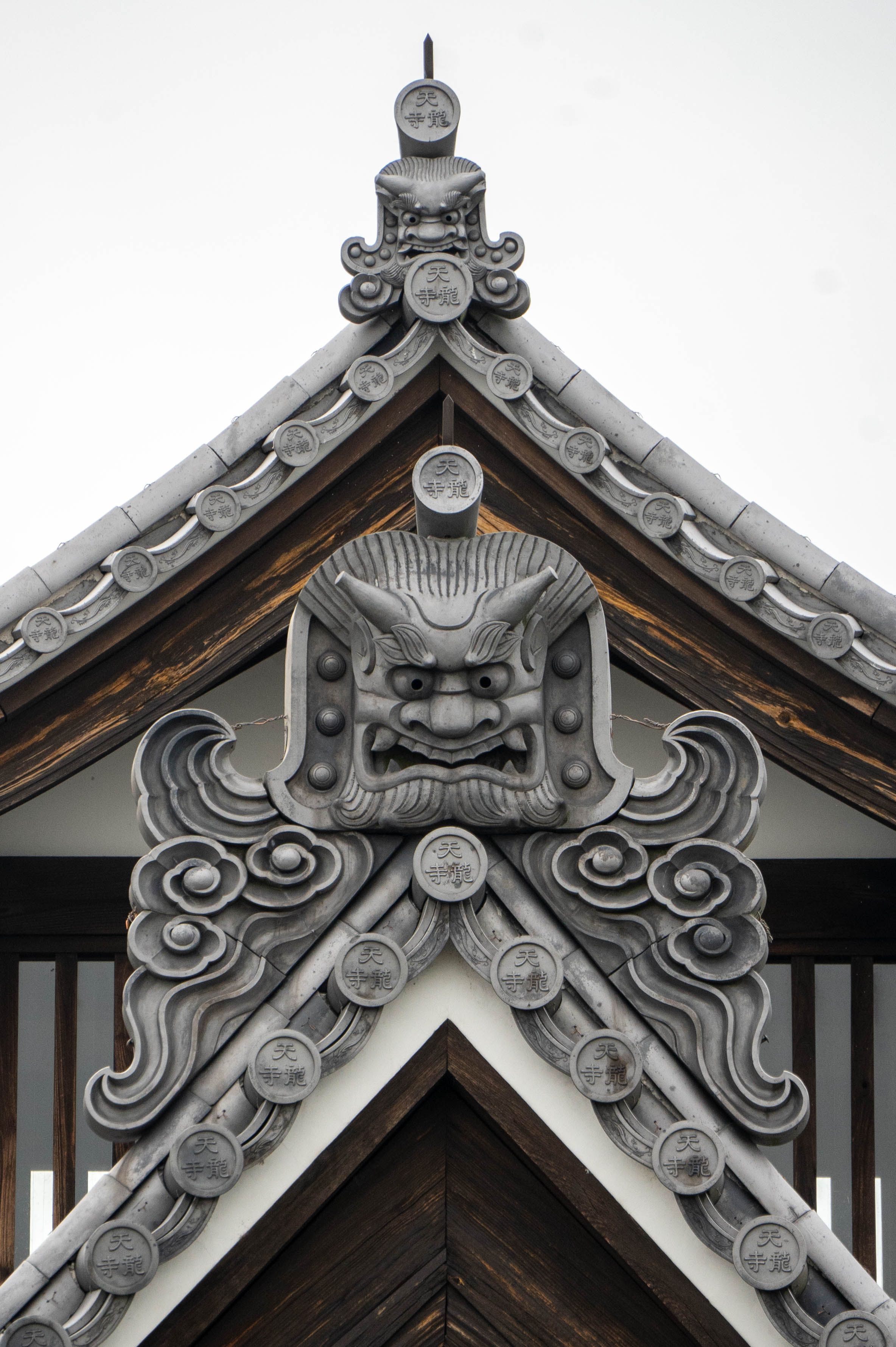 Traditional Japanese Roof Ornamentation Close-Up · Free Stock Photo