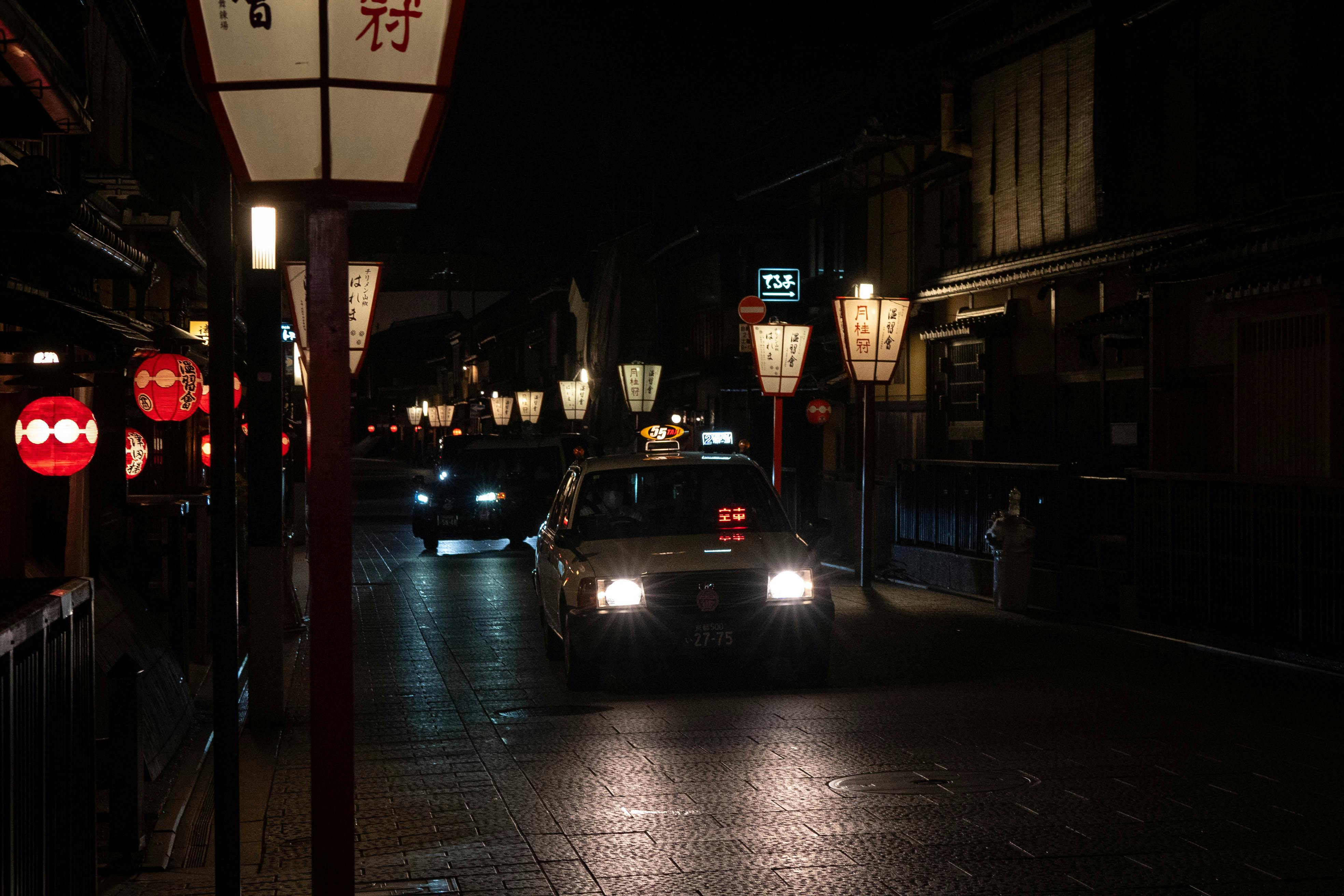 Traditional Japanese Street at Night with Lanterns · Free Stock Photo