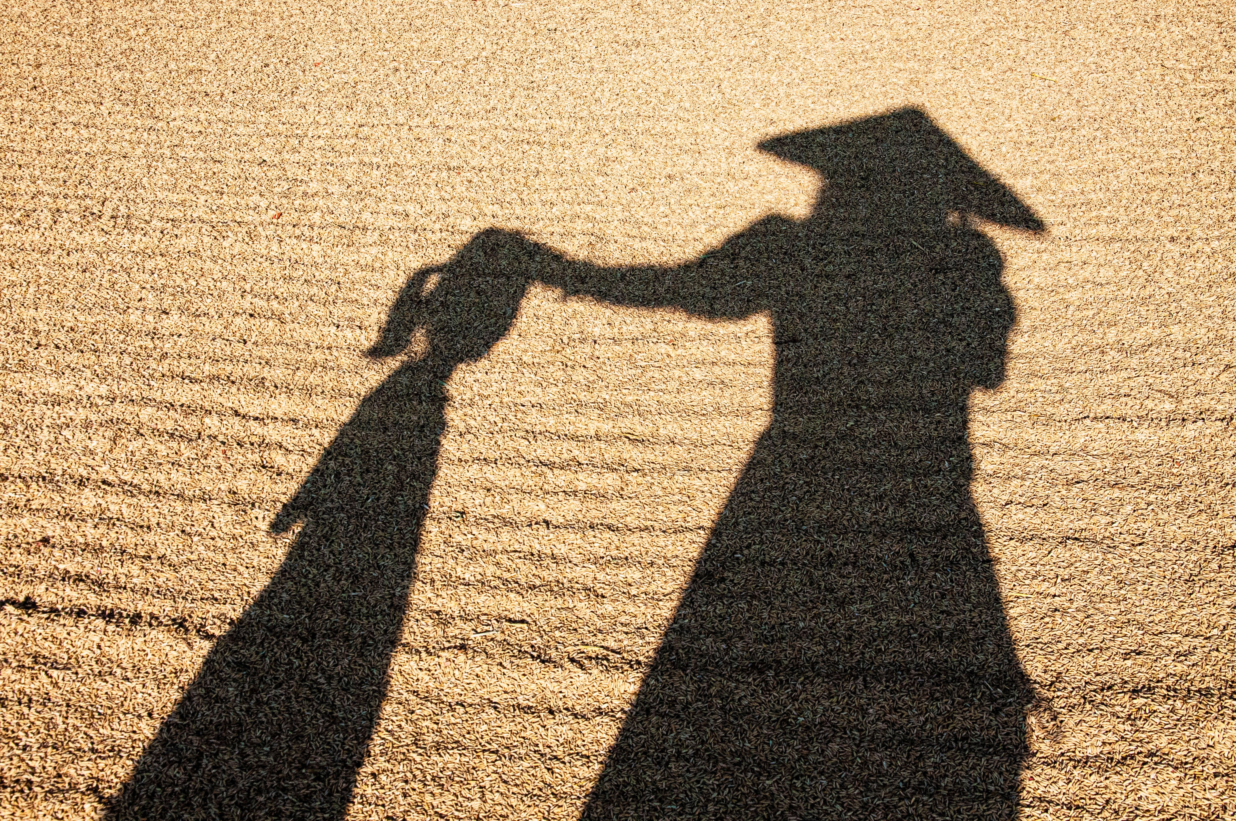 Shadow of Asian Farmer with Traditional Hat · Free Stock Photo