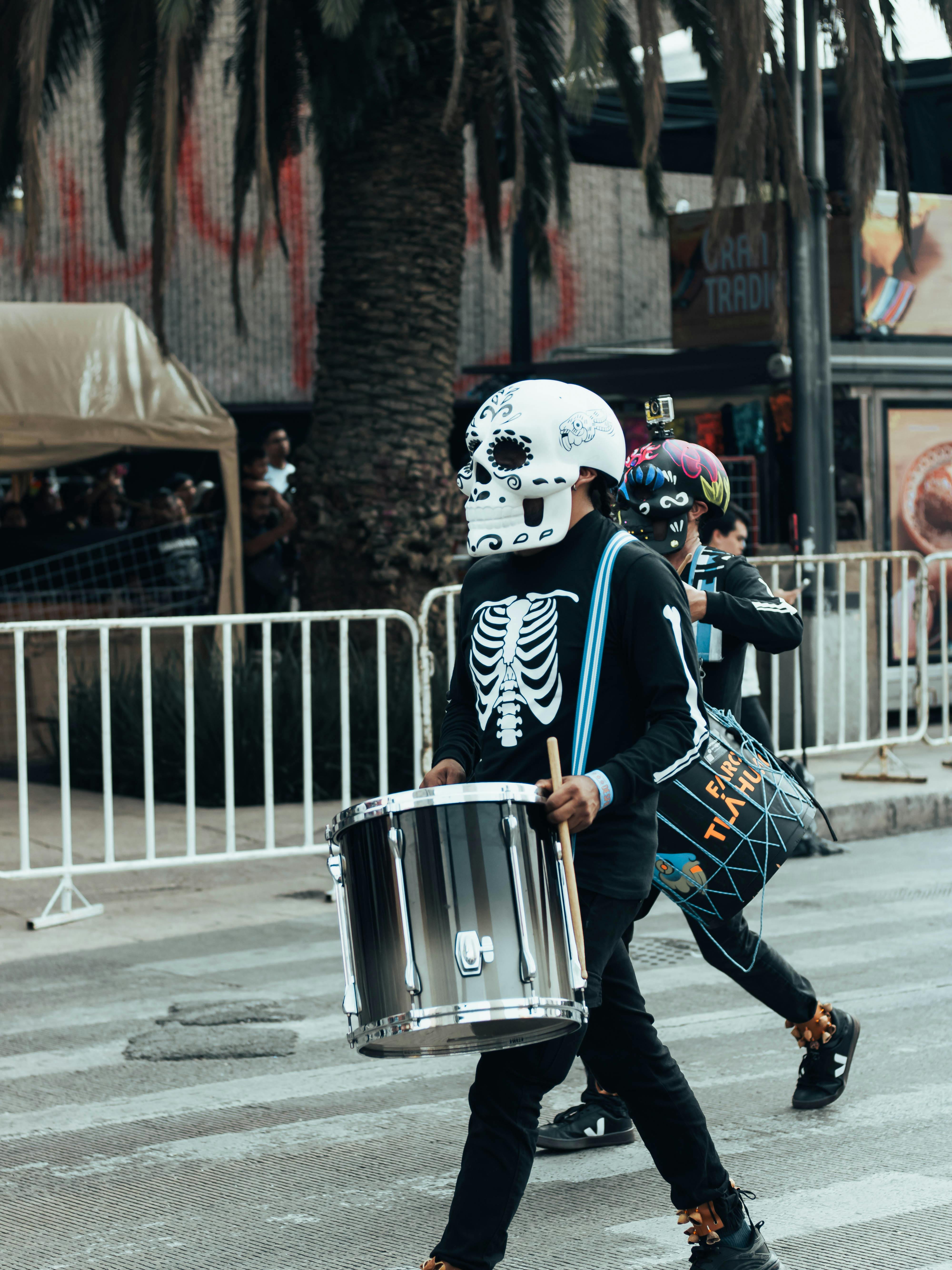 Day of the Dead Parade with Skeleton Costume Drummer · Free Stock Photo