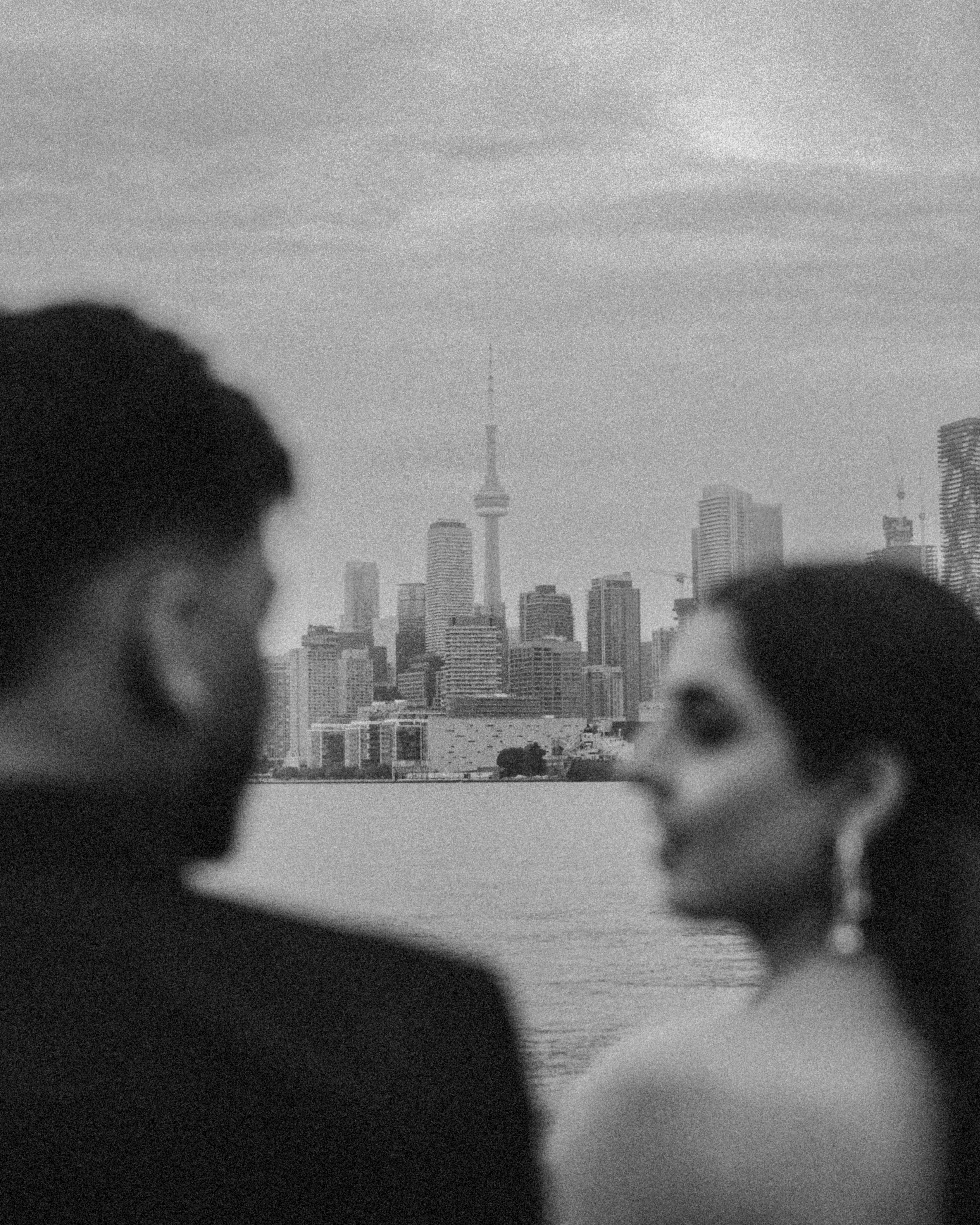 Romantic Couple Overlooking Toronto Skyline · Free Stock Photo