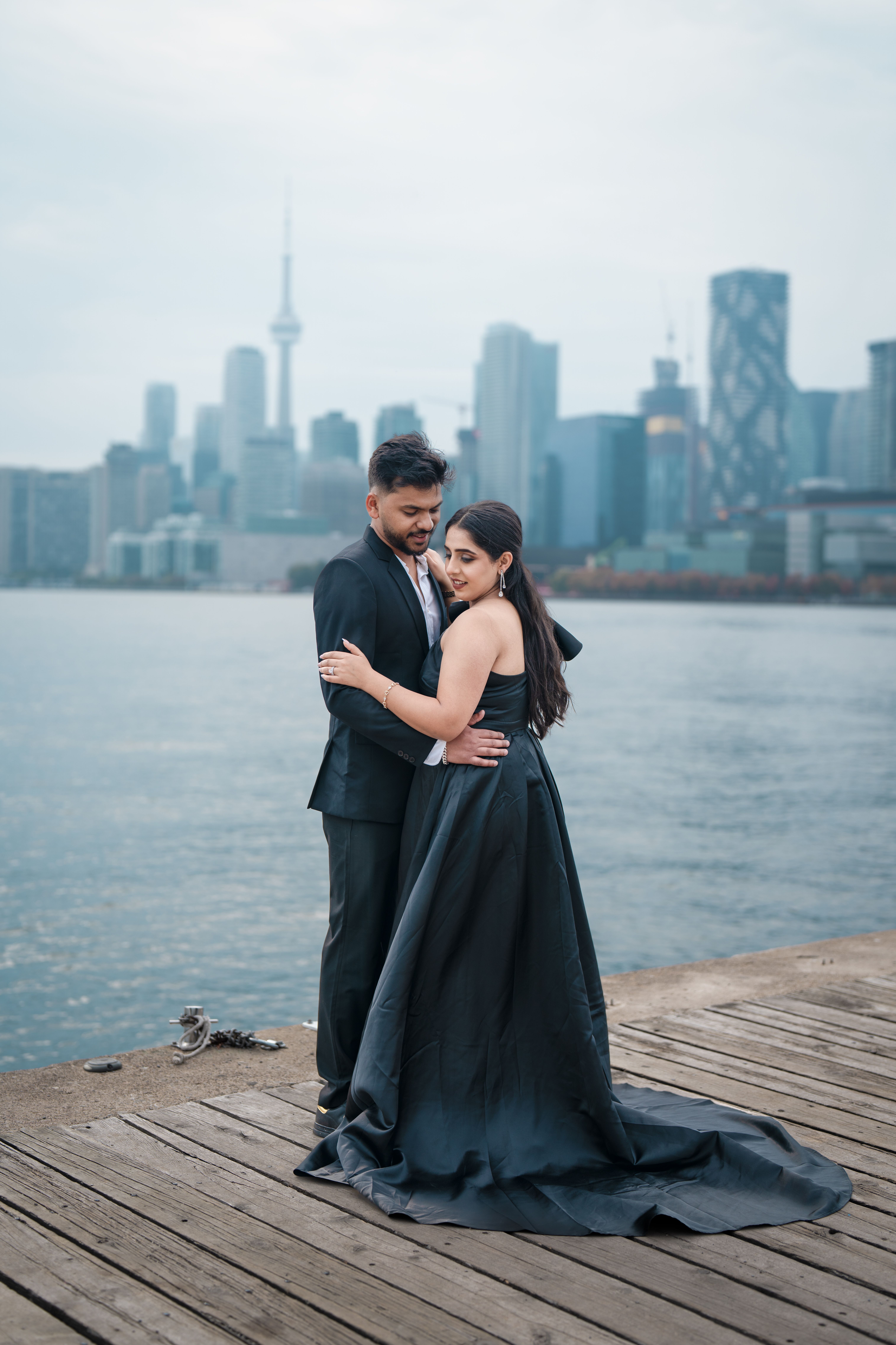 Romantic Couple Embracing by Toronto's Skyline · Free Stock Photo