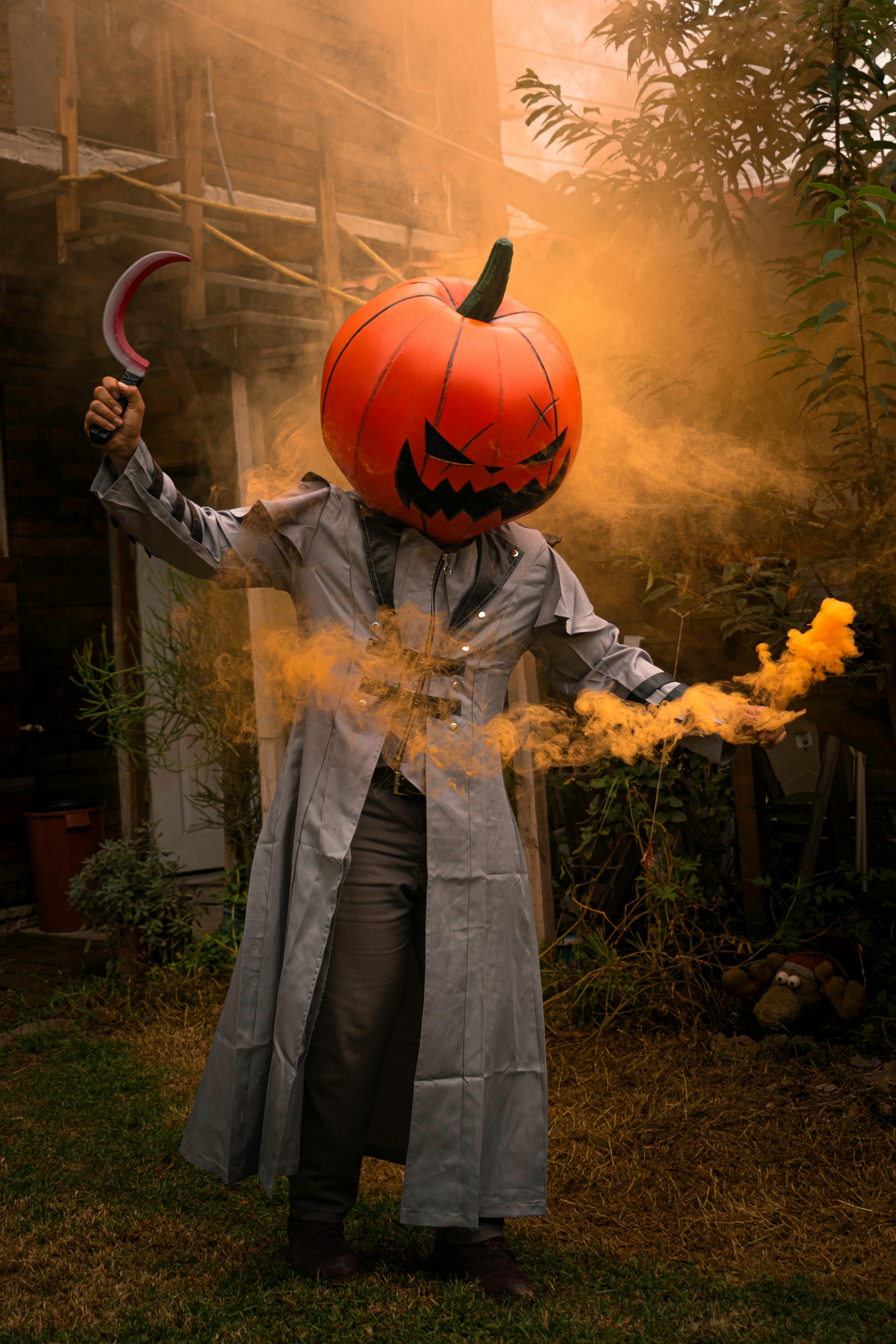 Spooky Halloween Scene with Pumpkin Head Costume · Free Stock Photo