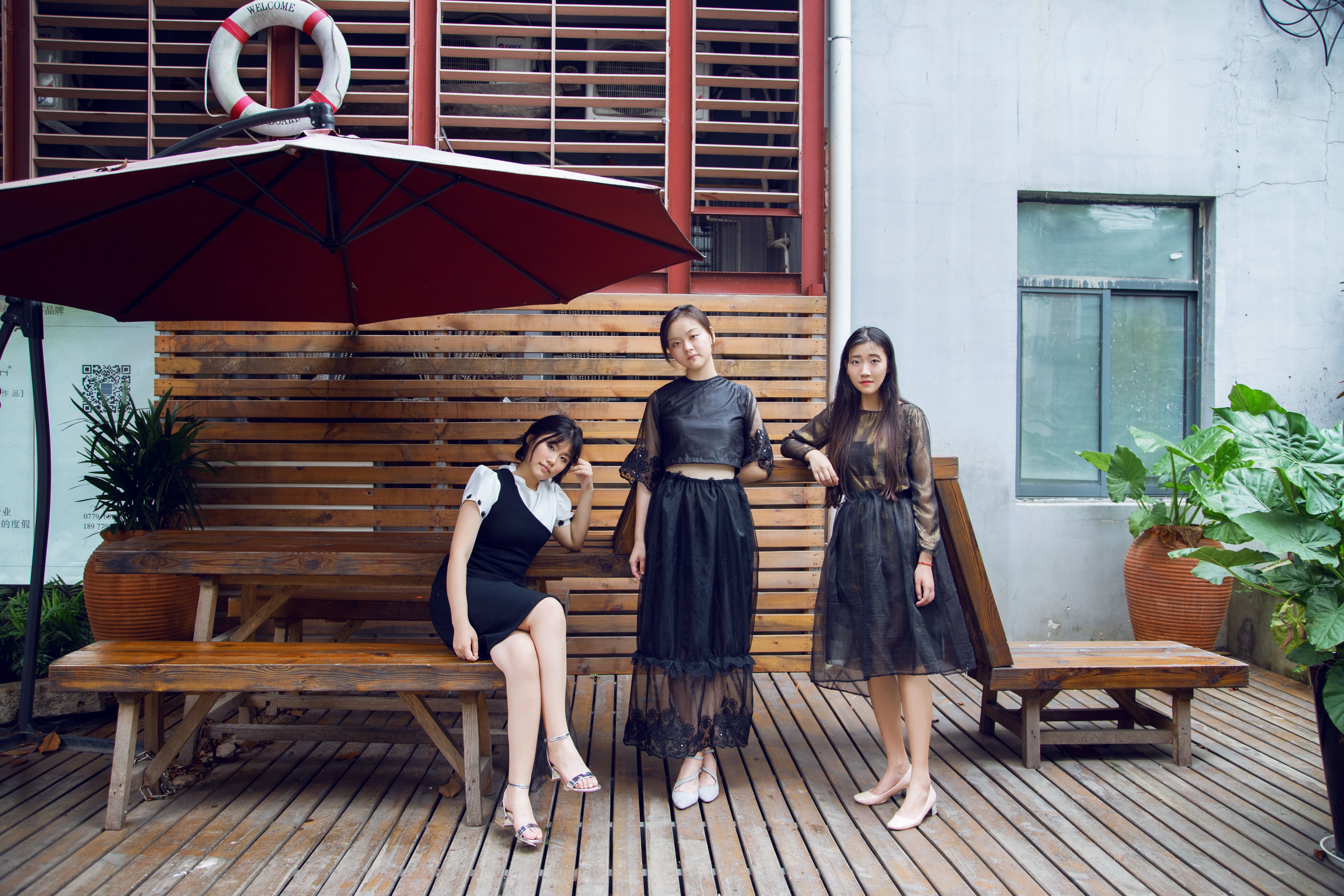 Chic Portrait of Three Women in Stylish Dresses · Free Stock Photo