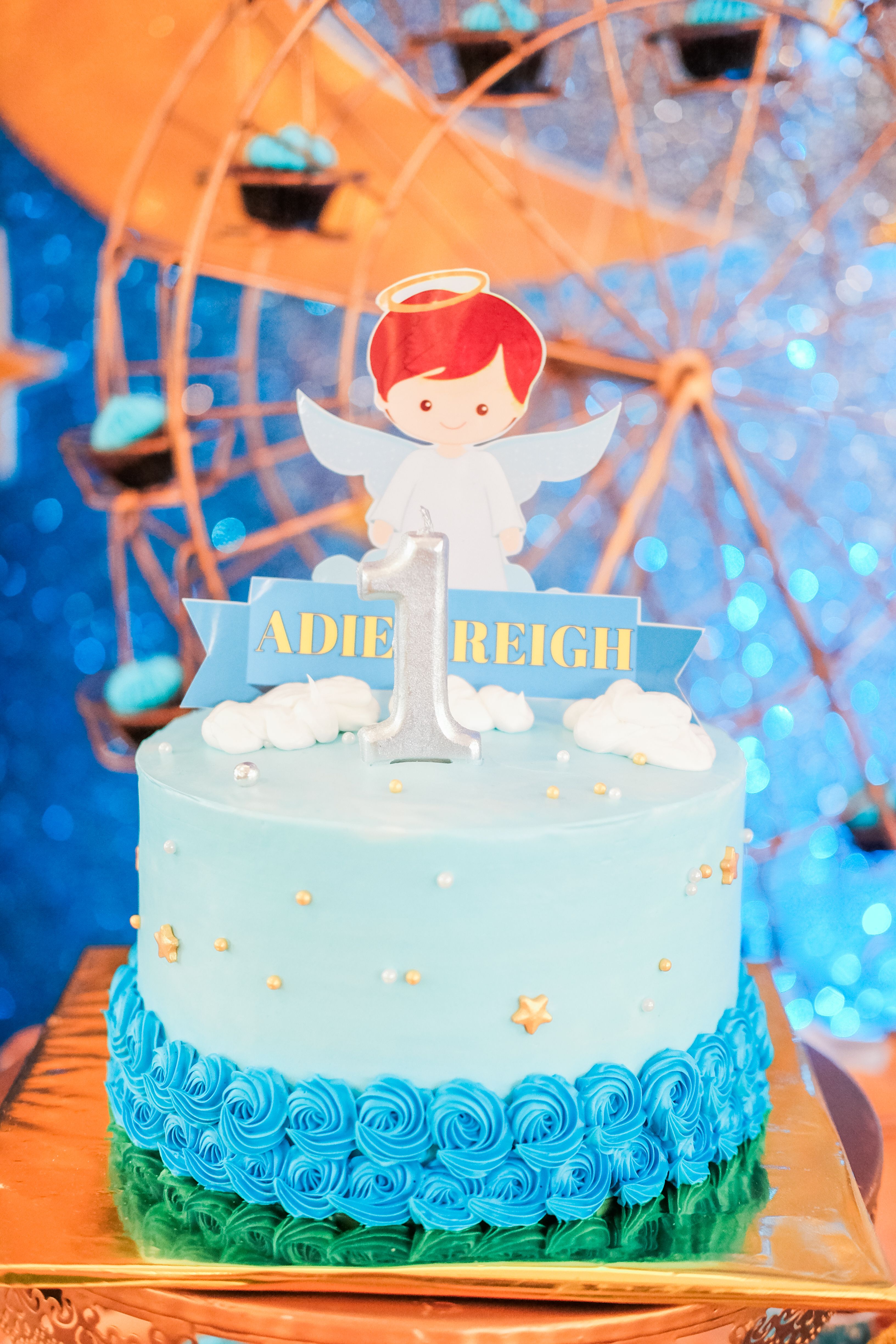 Whimsical Blue Angel-Themed Birthday Cake · Free Stock Photo