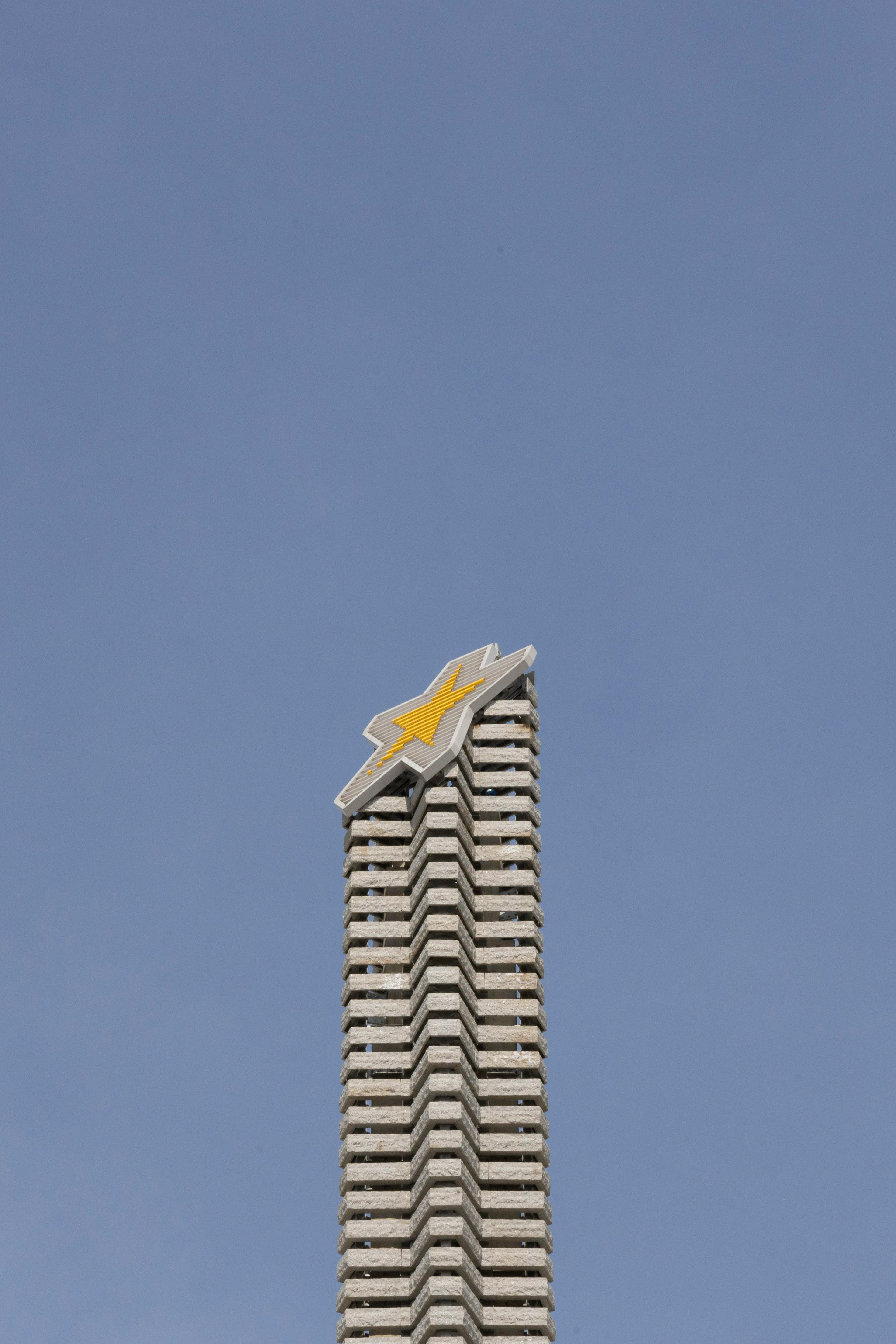 Modern Skyscraper with Unique Star Design · Free Stock Photo