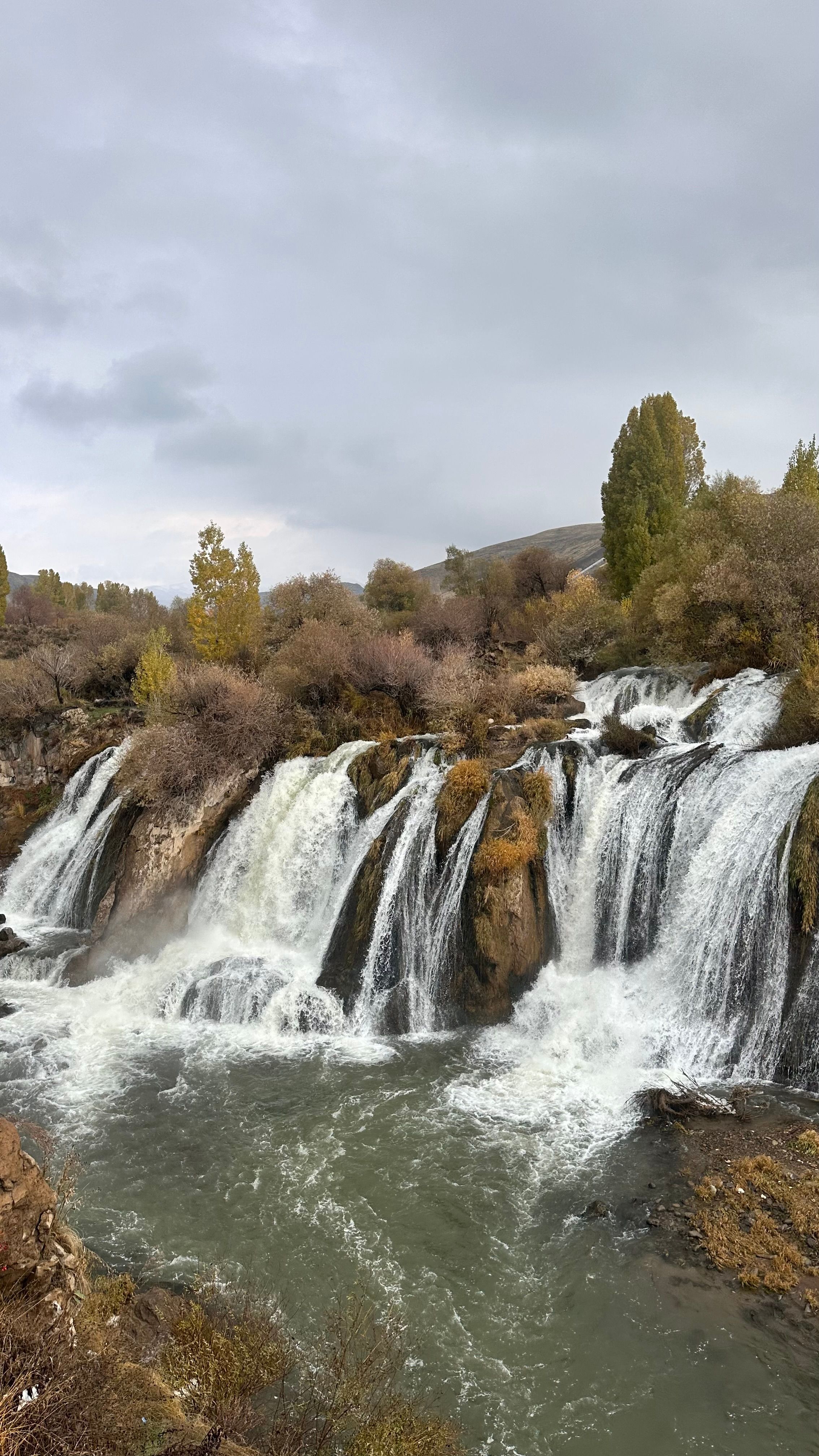 Scenic Autumn Waterfall in Lush Forest Setting · Free Stock Photo