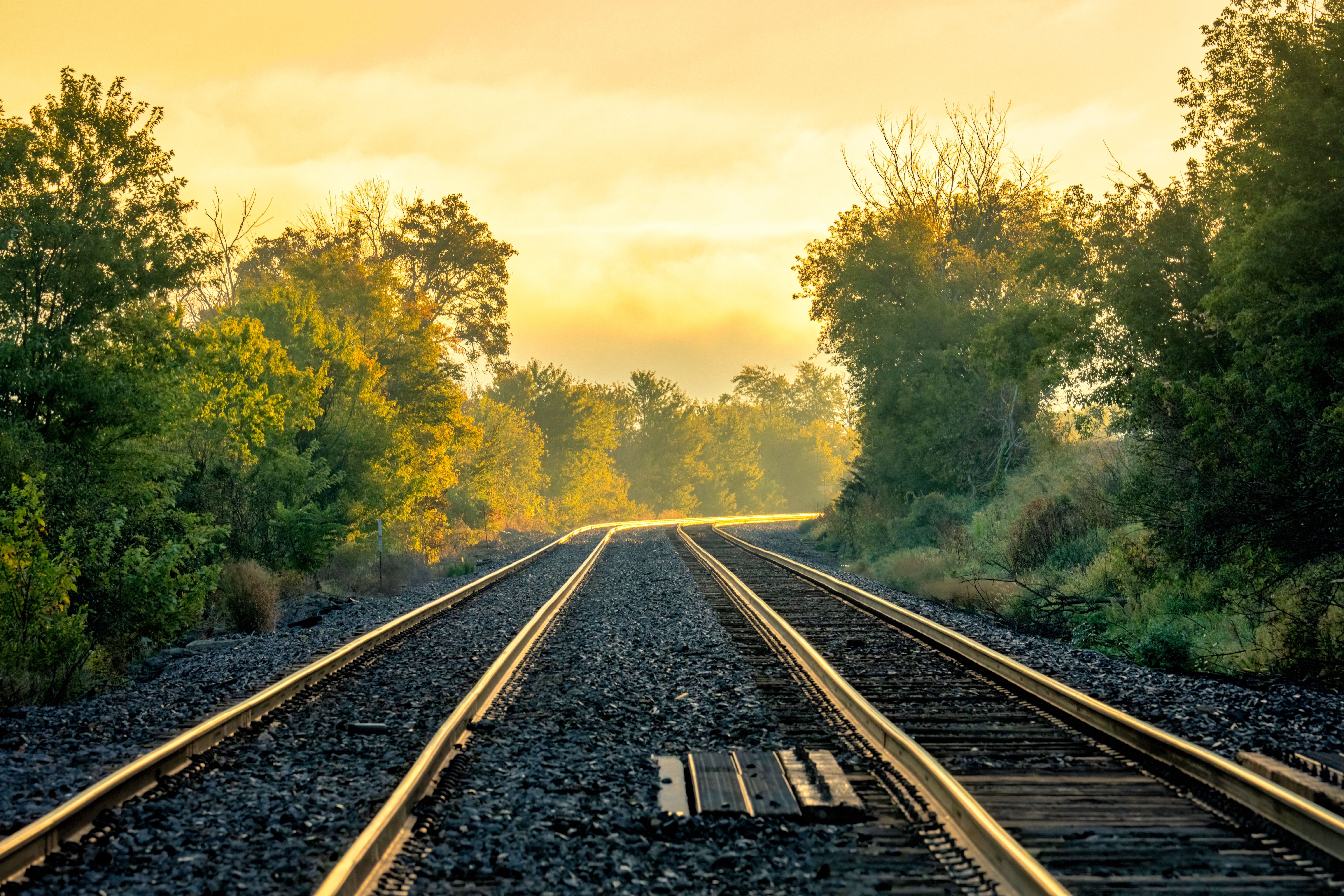Golden Sunset Over Minnesota Railroad Tracks · Free Stock Photo
