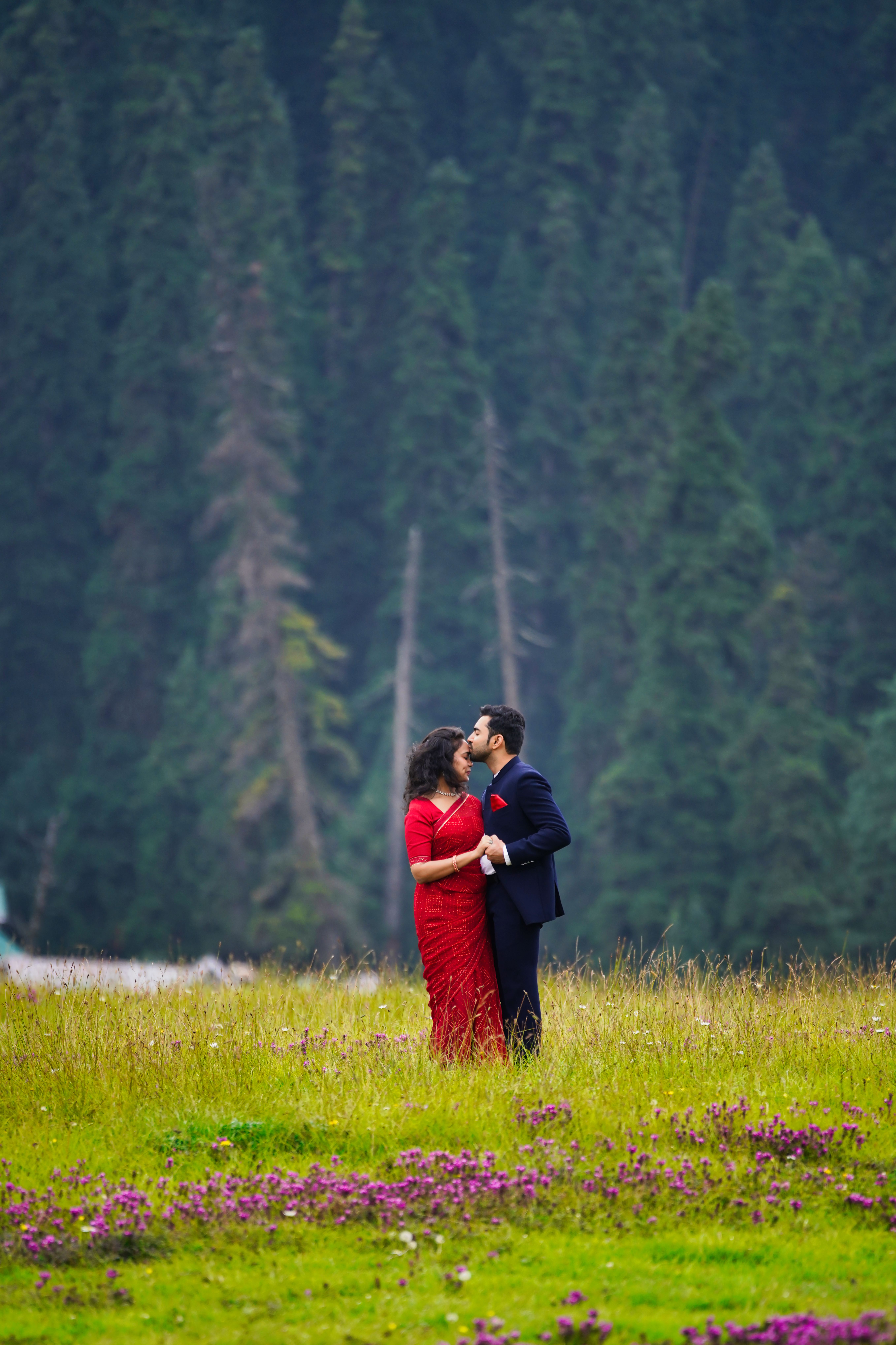 Two People Standing in Forest · Free Stock Photo