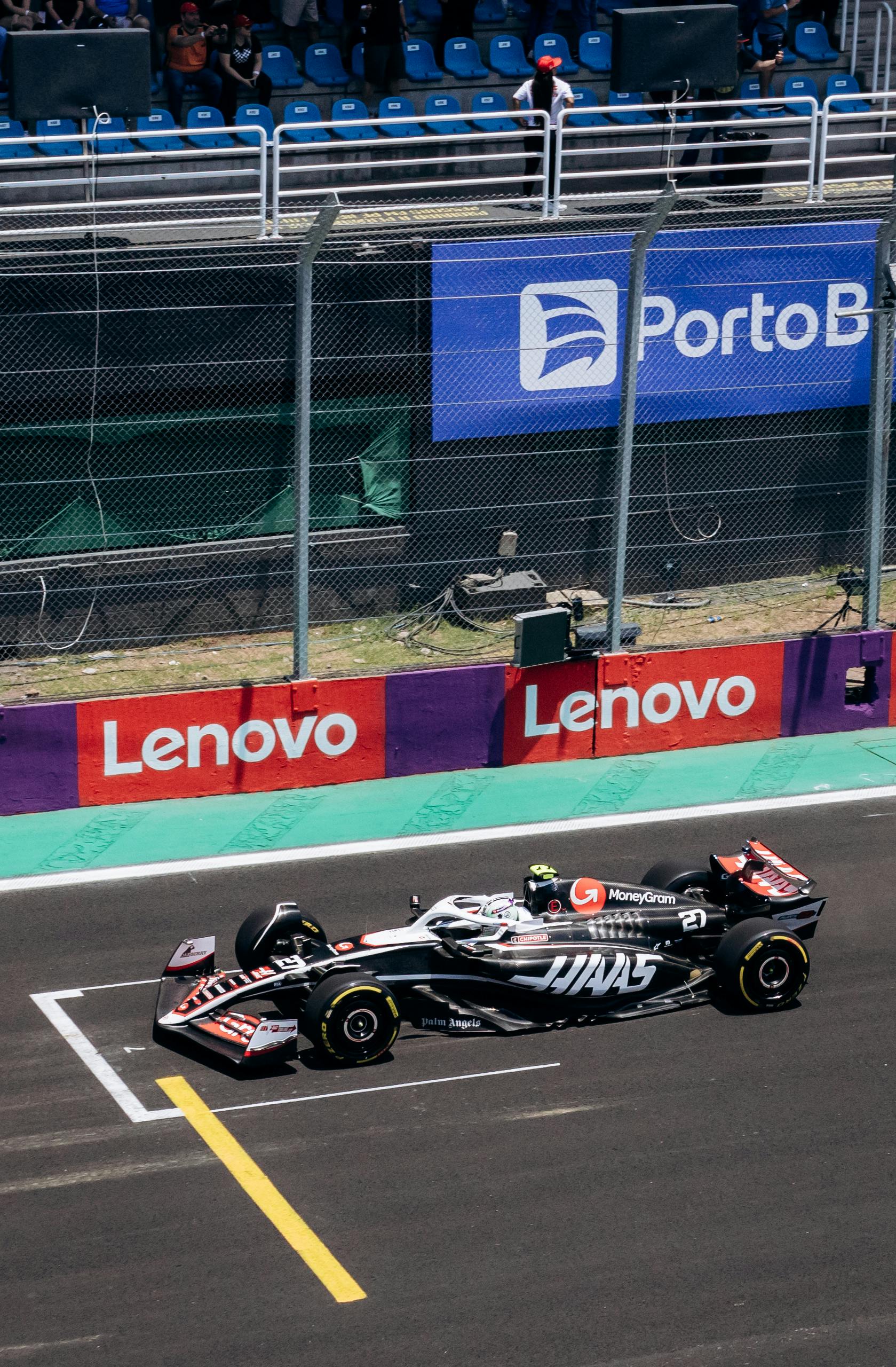 Exciting Formula One Race Car on Track · Free Stock Photo