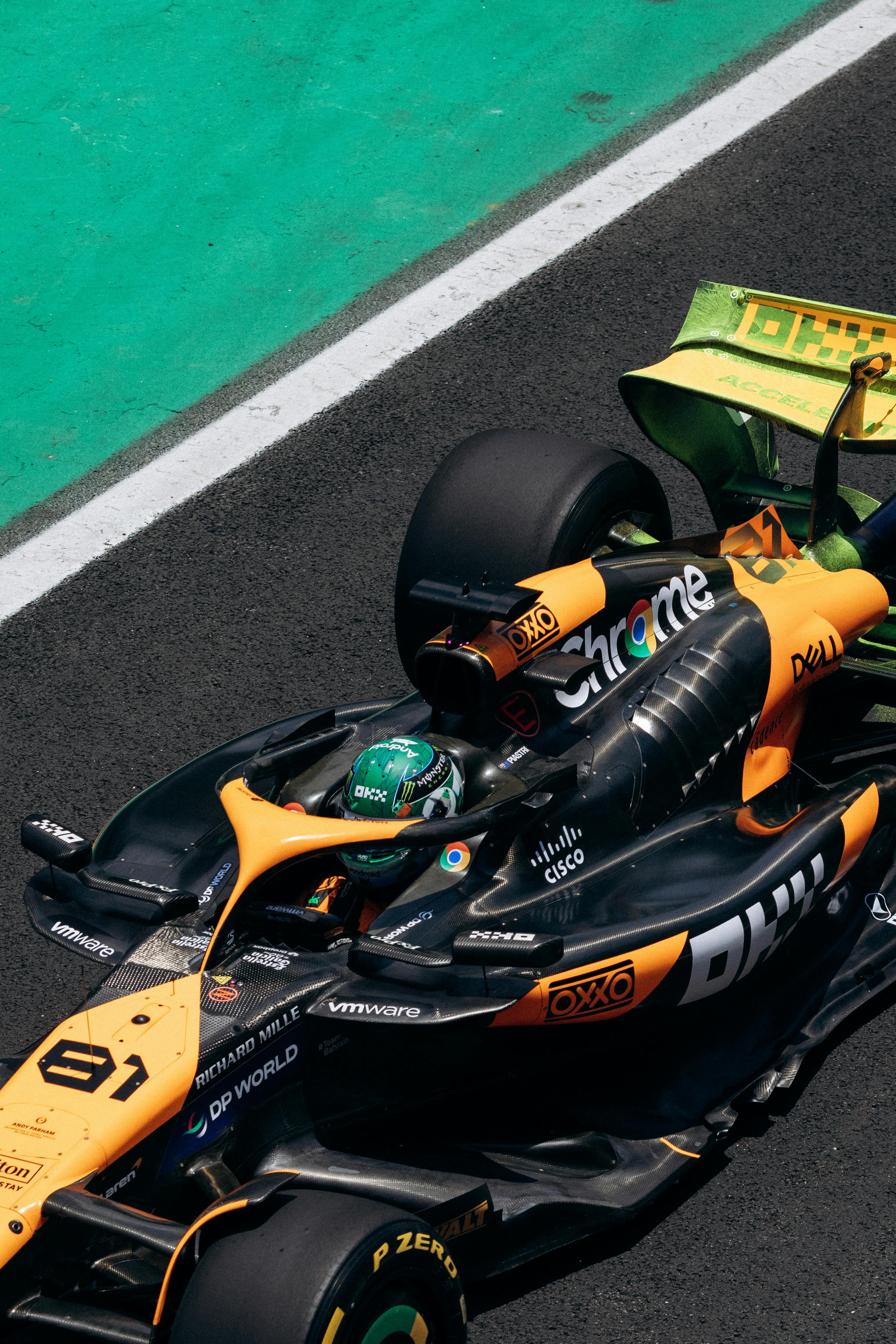 High-Speed Formula 1 Car on the Race Track · Free Stock Photo