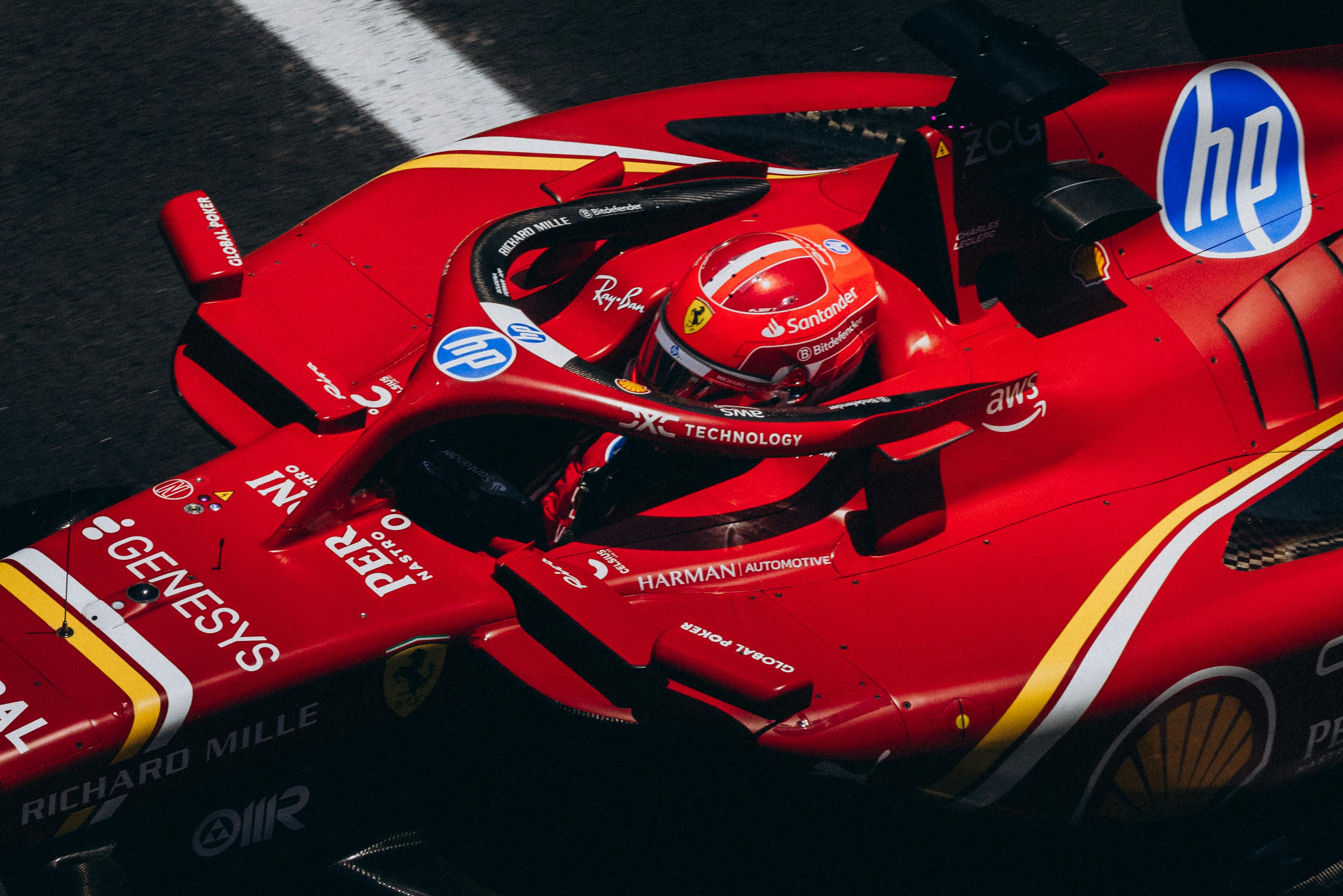 Dynamic Red Racing Car in Action on Track · Free Stock Photo