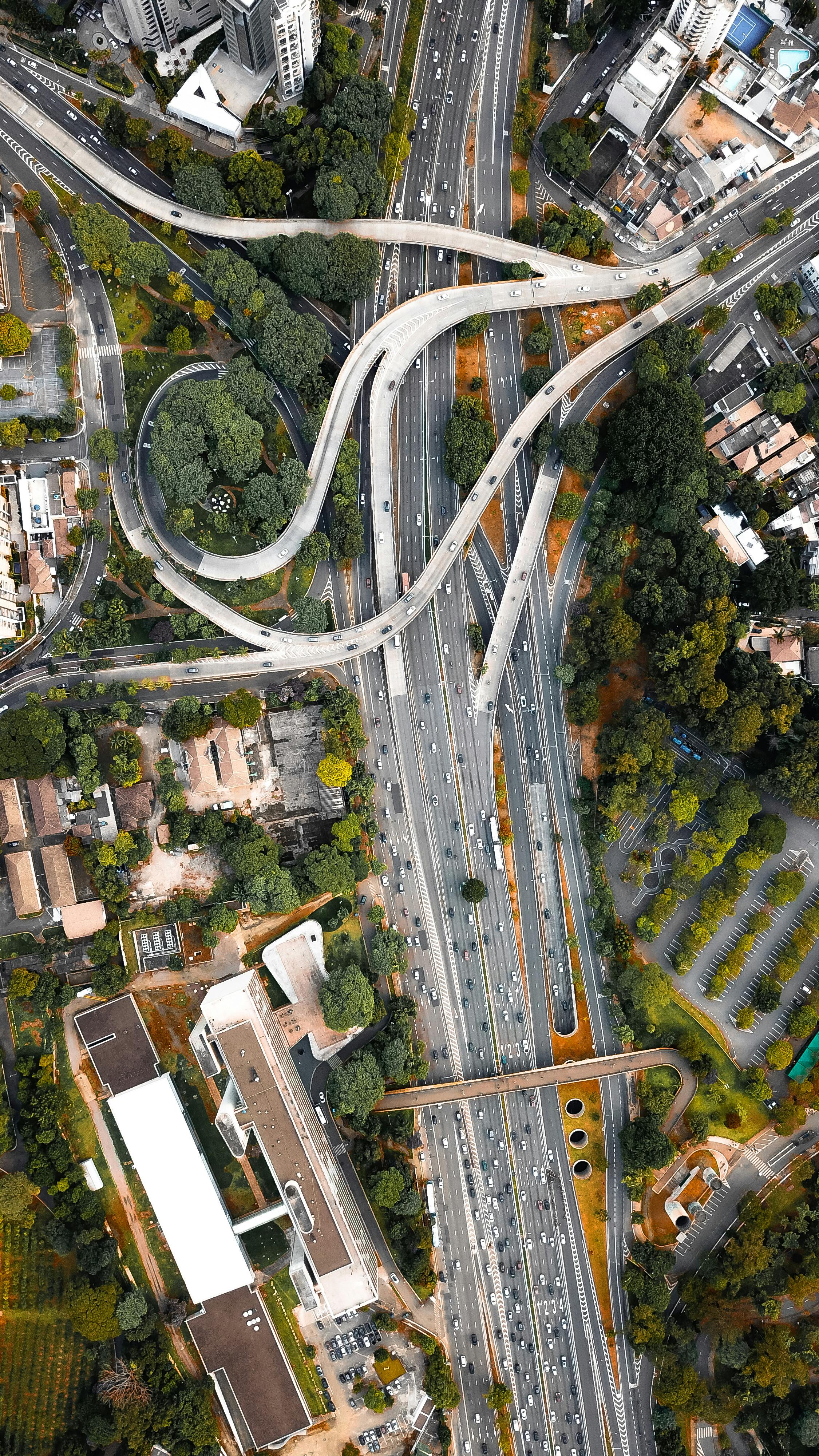 Aerial View of Intricate Urban Highway Interchange · Free Stock Photo