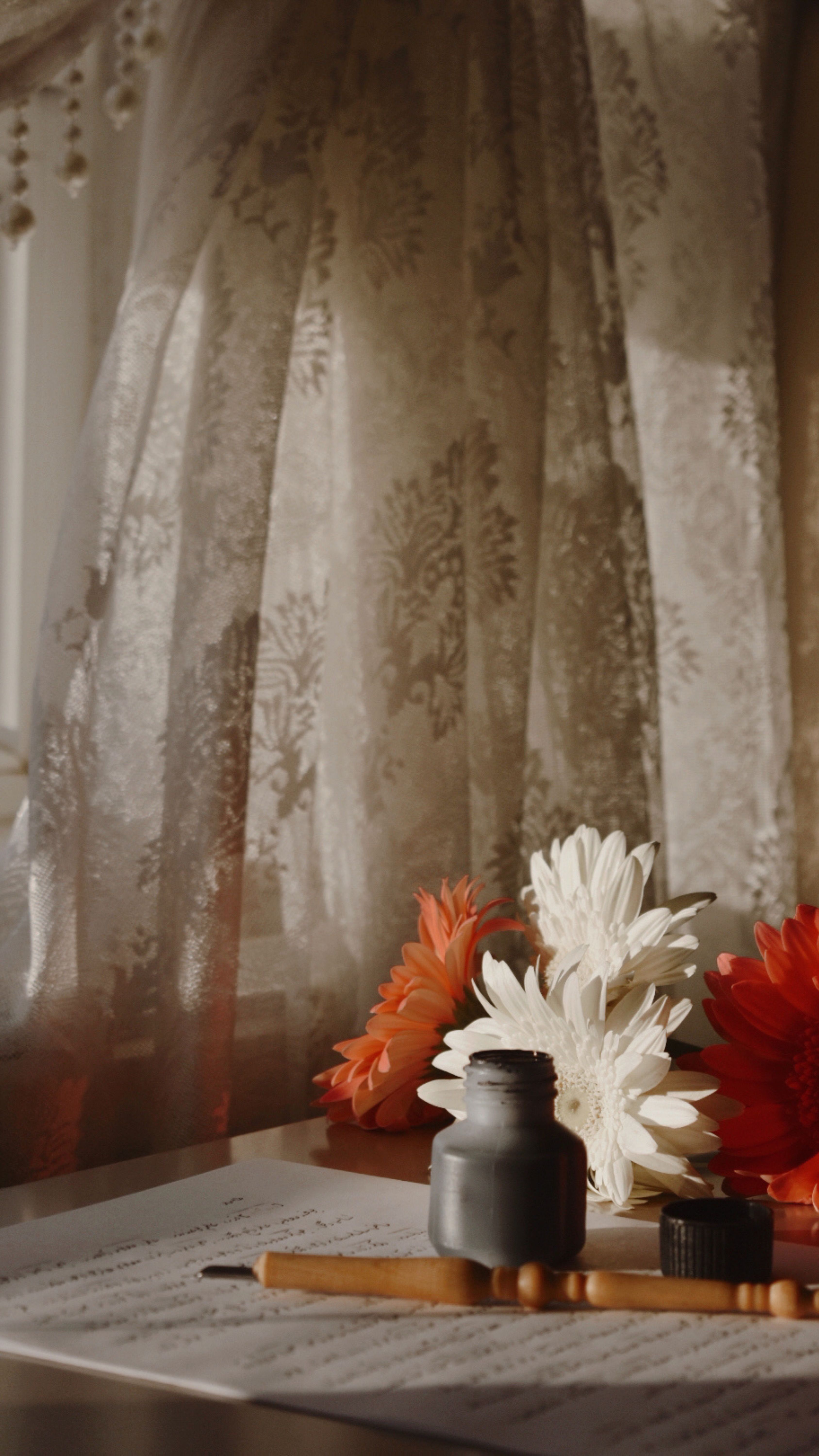 Artistic Still Life with Flowers and Ink Pot · Free Stock Photo