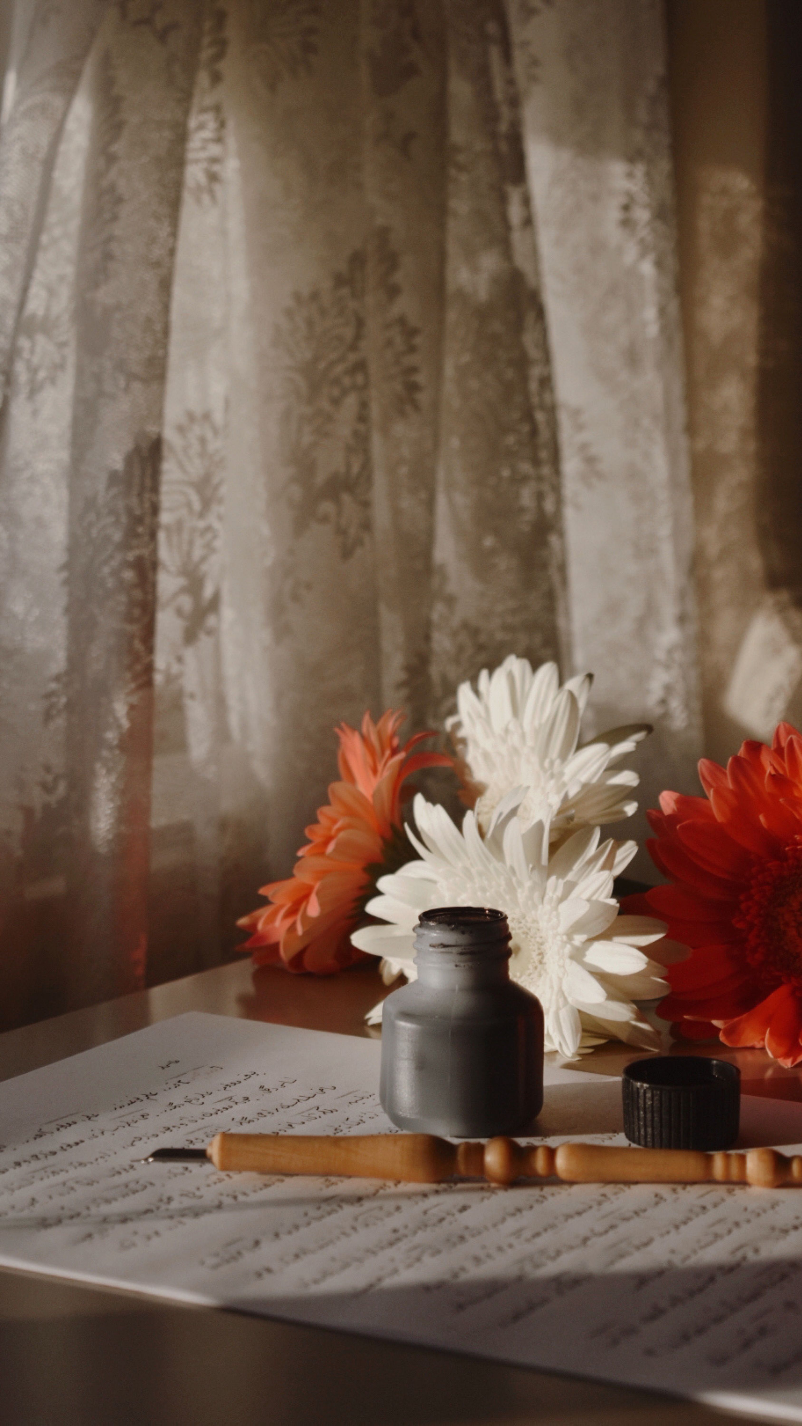 Artistic Still Life with Ink and Flowers · Free Stock Photo