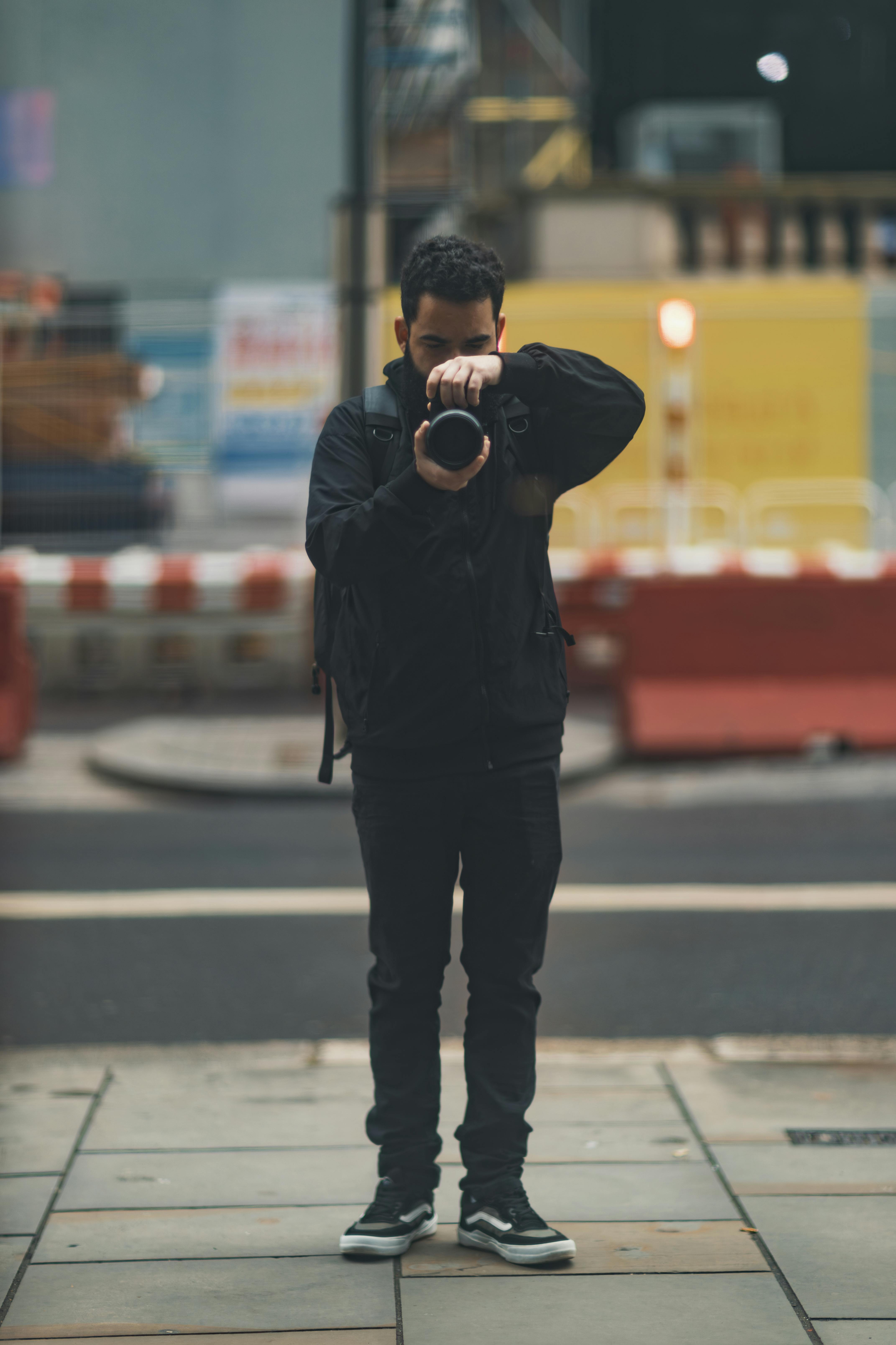 Urban Street Photographer Capturing City Life · Free Stock Photo