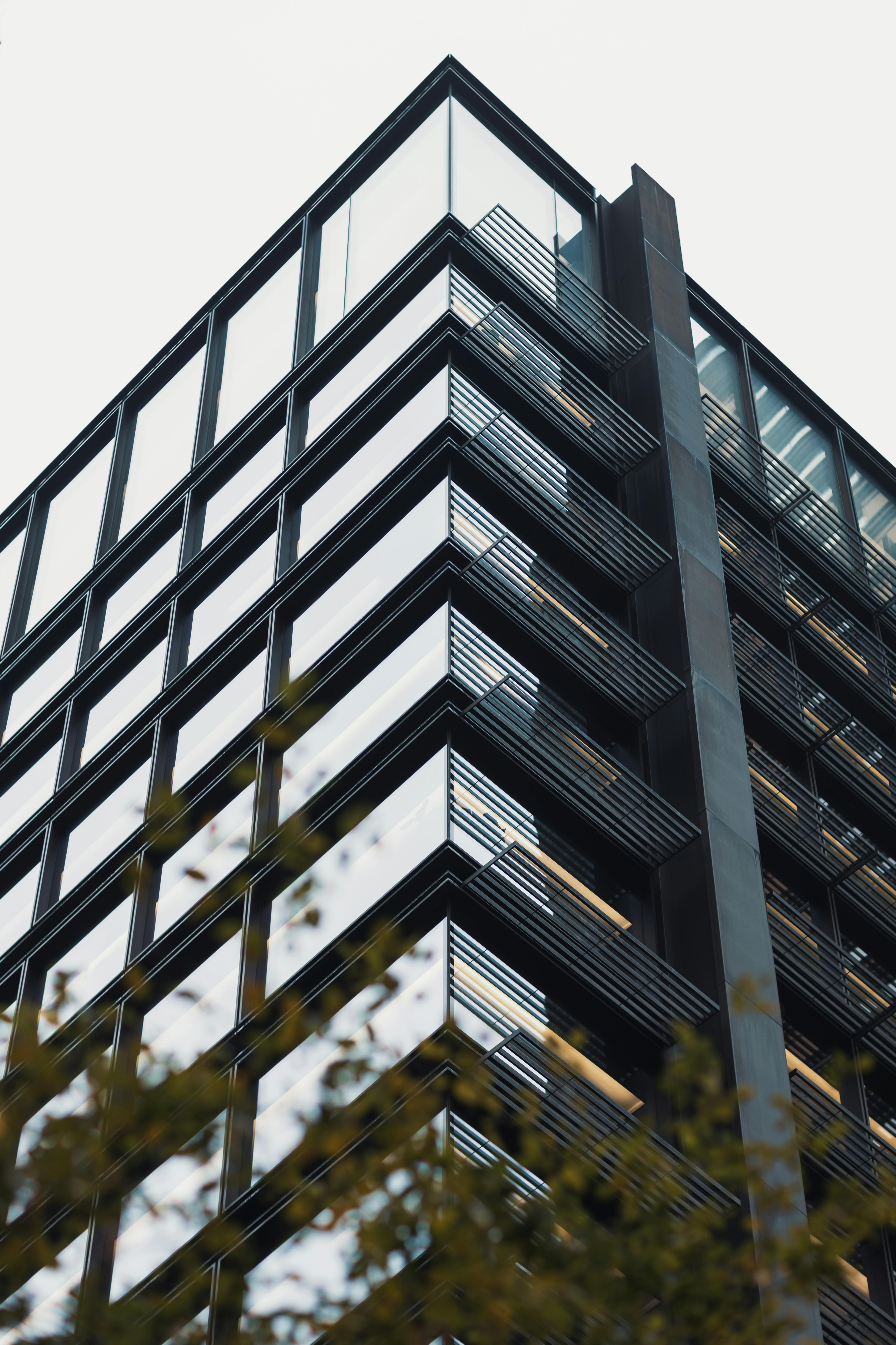 Modern Glass Office Building Facade View · Free Stock Photo