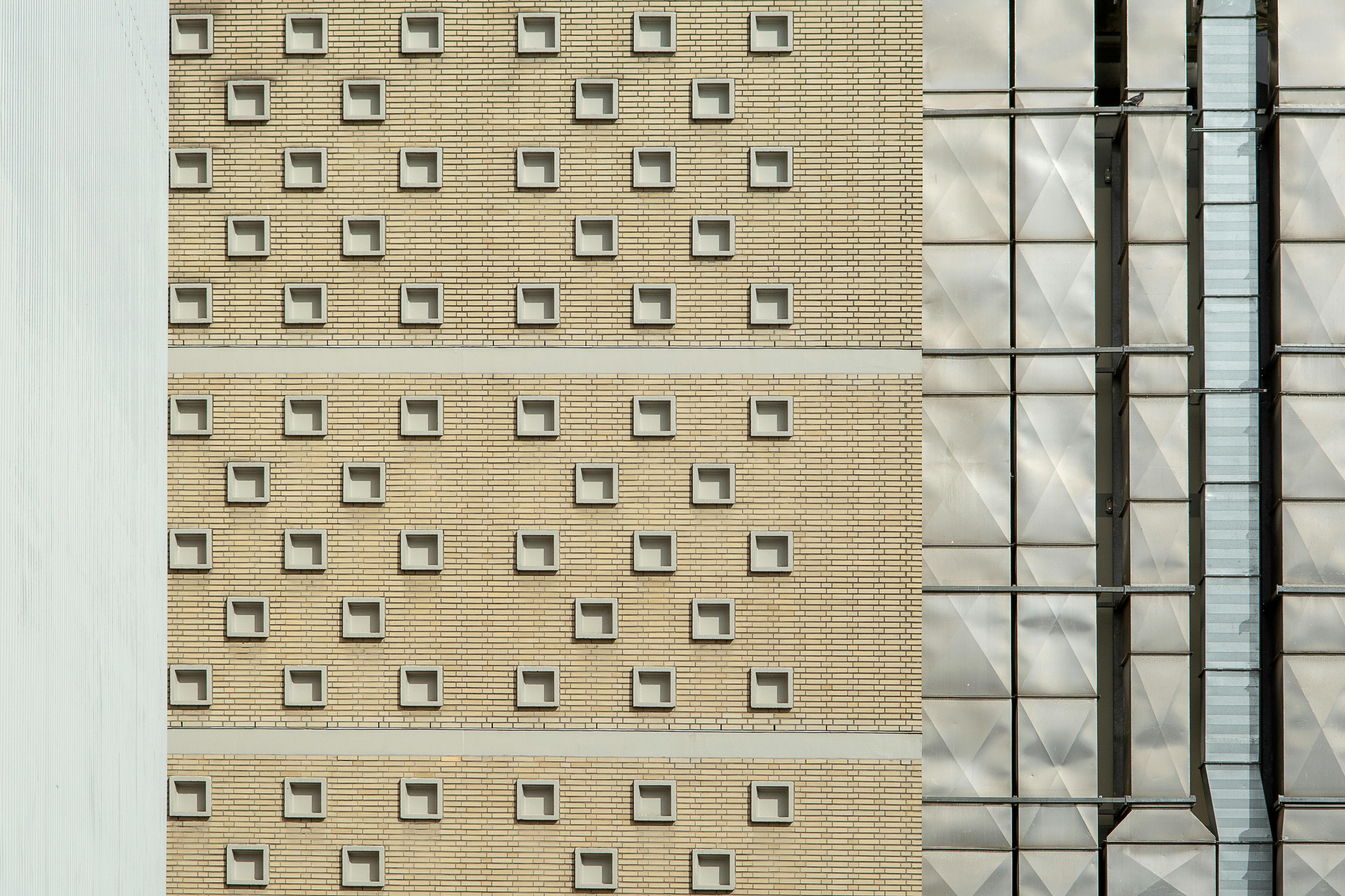 Abstract Urban Architecture with Geometric Facade · Free Stock Photo