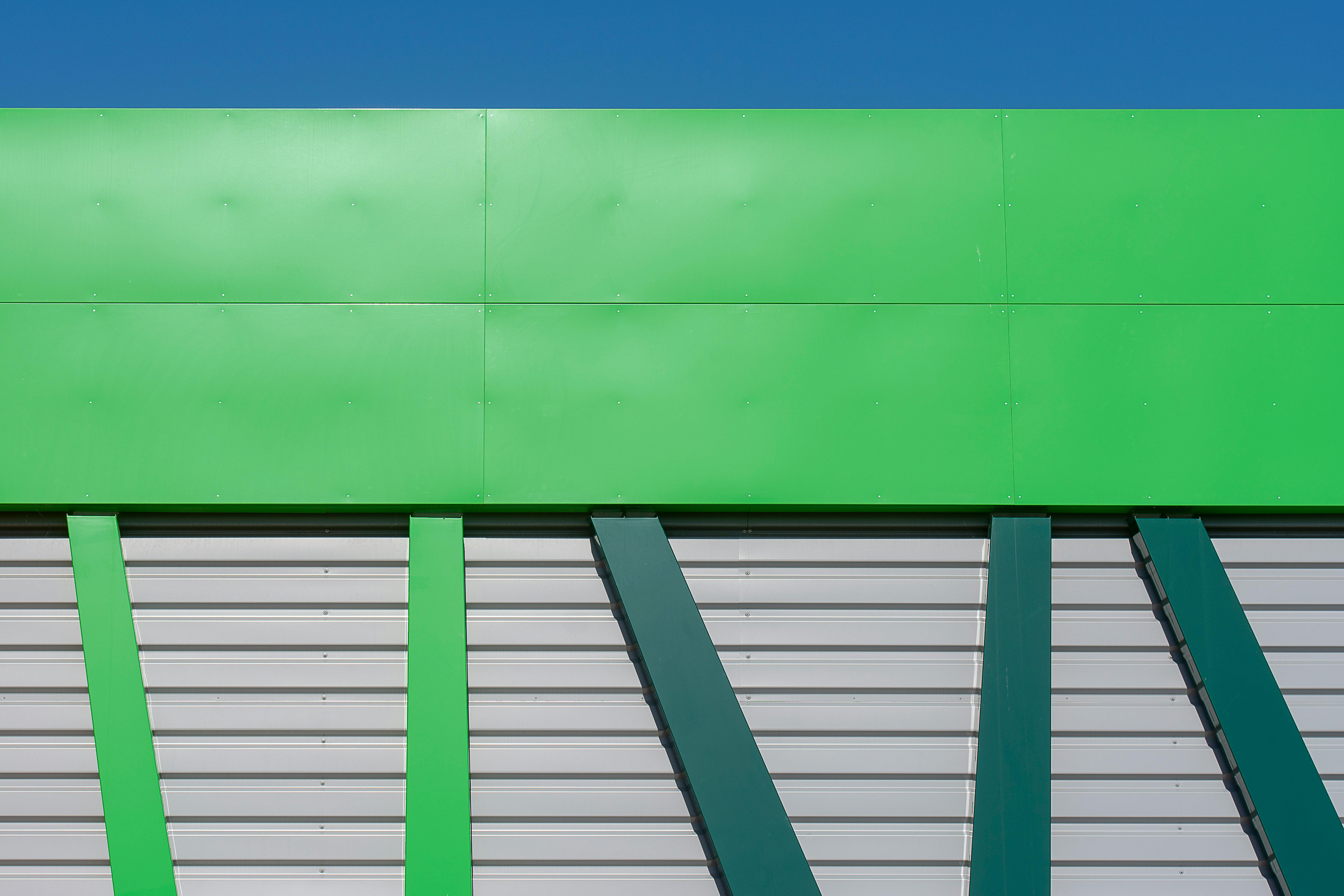 Modern Green Industrial Building Facade · Free Stock Photo