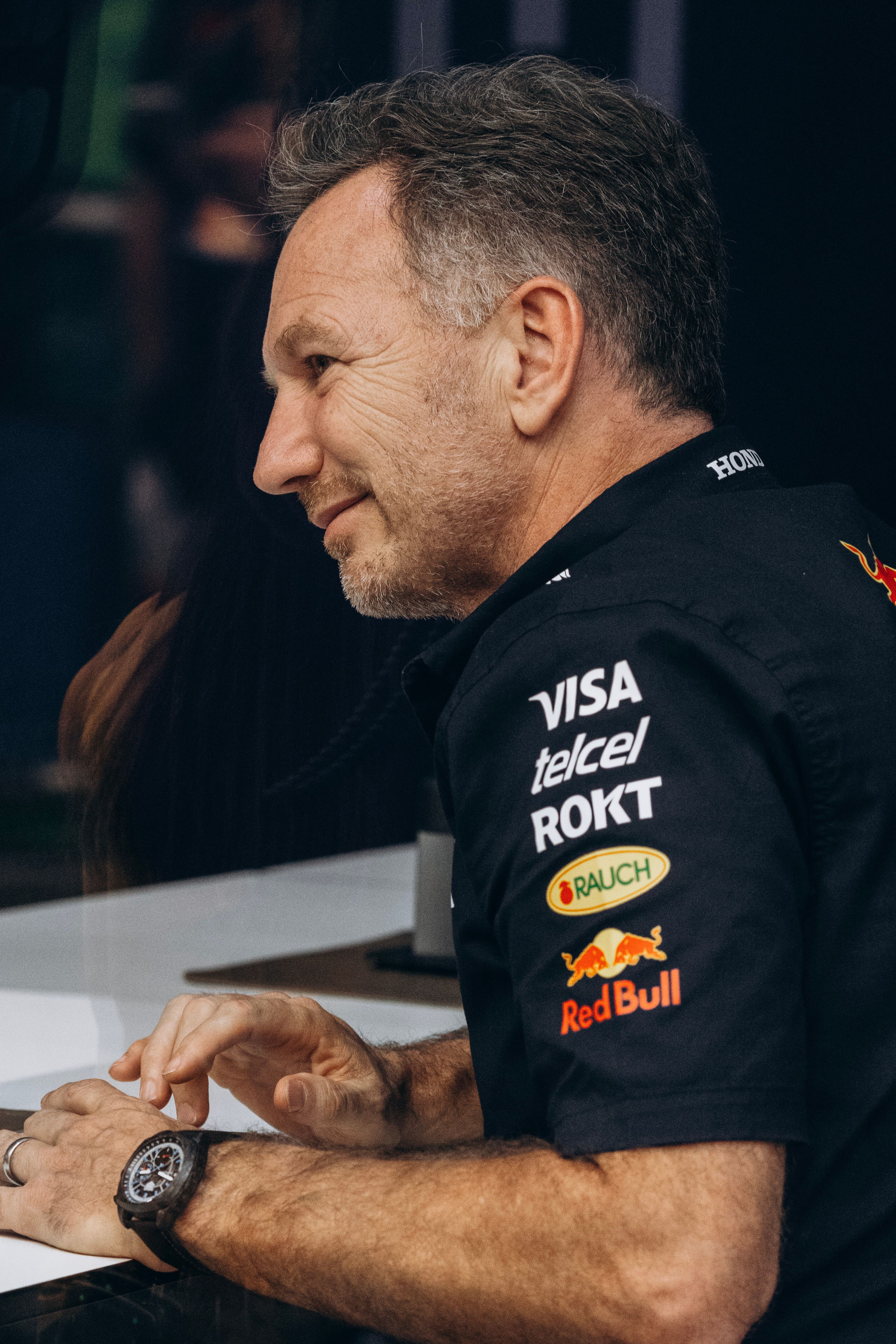 Profile Portrait of Man in Branded Shirt · Free Stock Photo